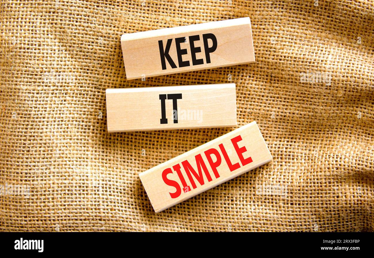 Keep it simple symbol. Concept word Keep it simple on beautiful wooden ...