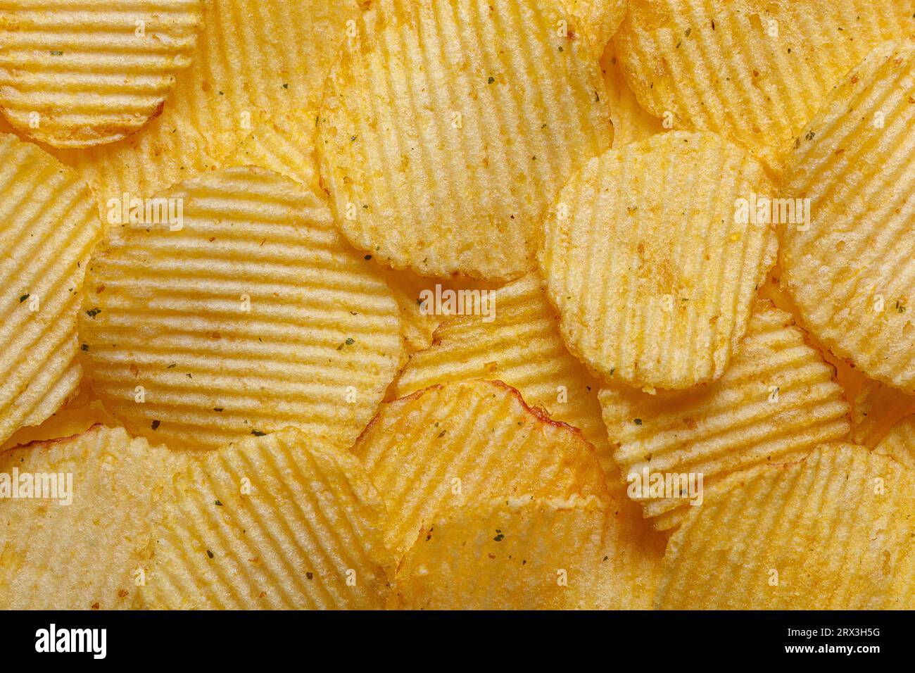 Lots of potato chips, texture close up Stock Photo - Alamy