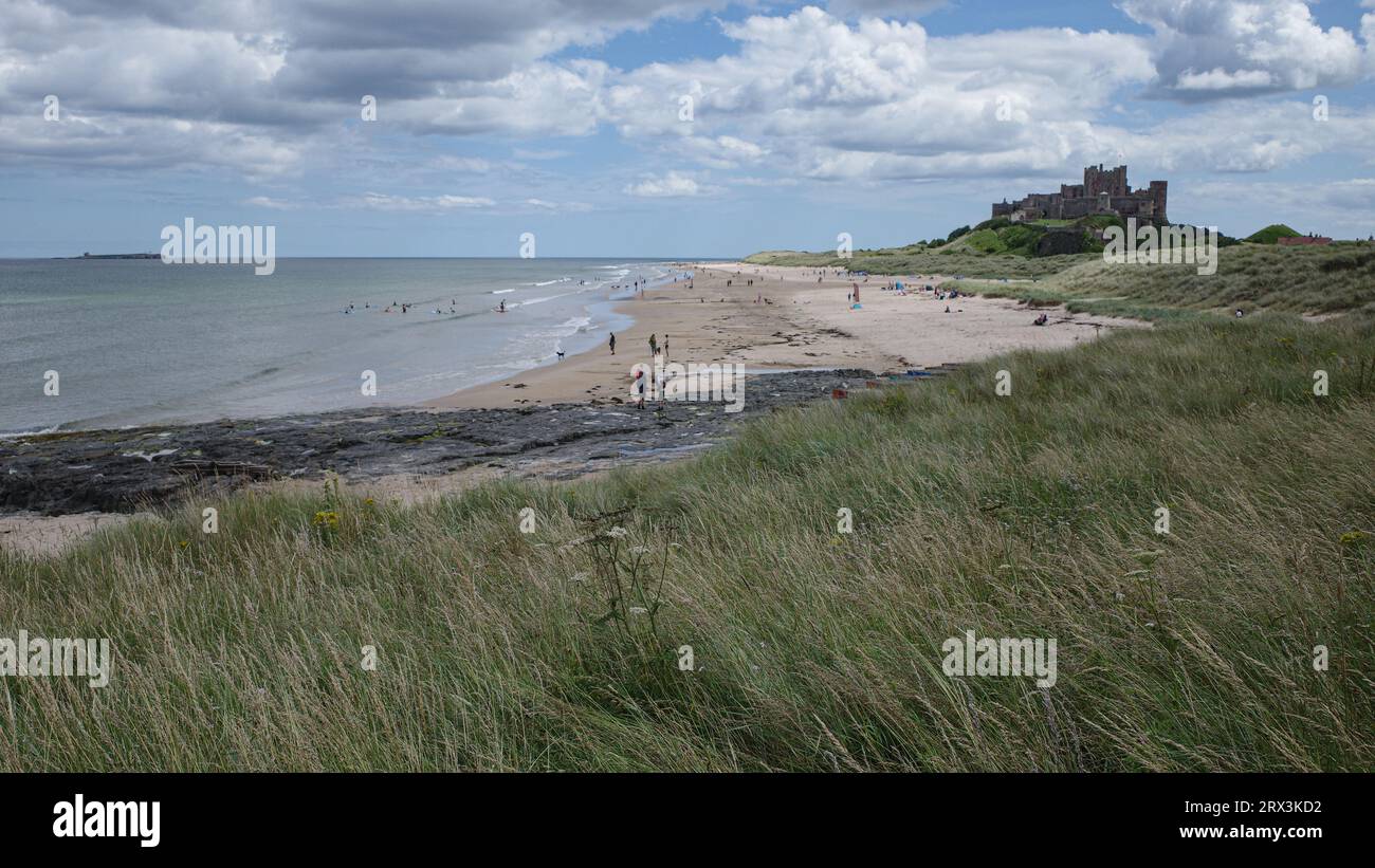 Bamburgh, UK - 14 July, 2023: Bamburgh castle and Northumbrian coast ...
