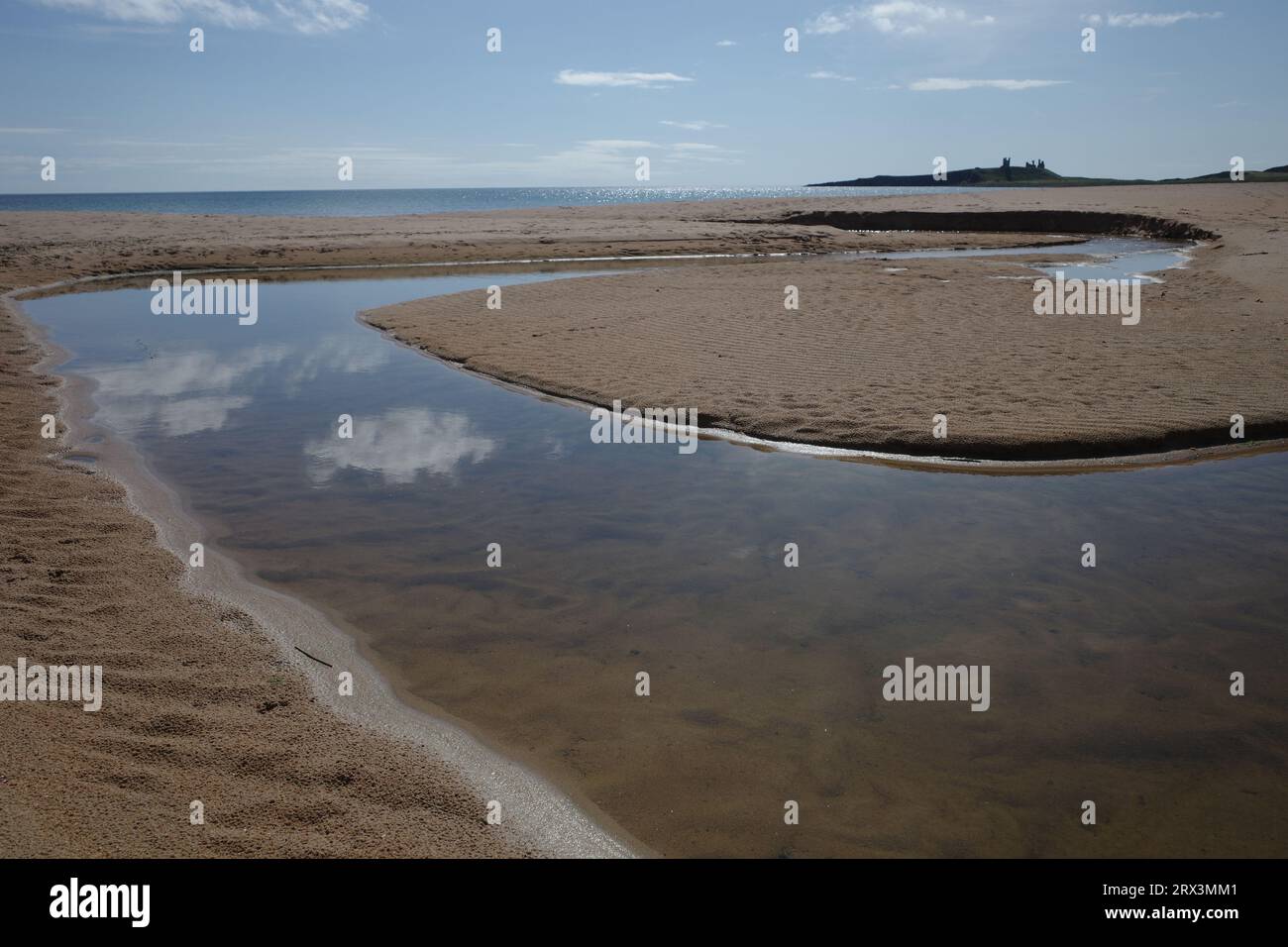 Low Newton, UK - 13 July, 2023: Views of Dunstanburgh castle and the ...