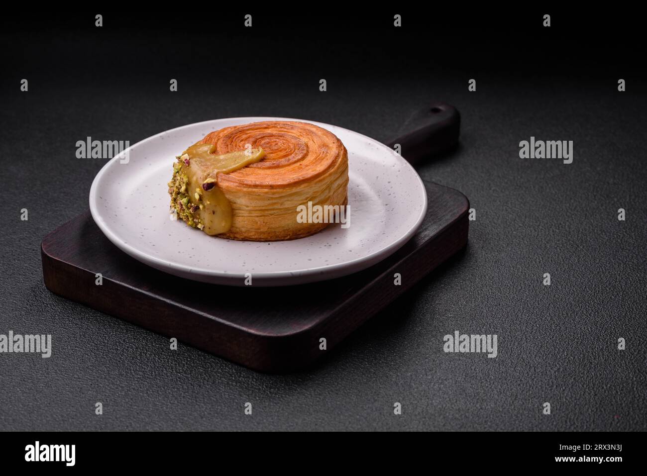 Round puff pastry croissant with raspberry filling or new york roll on ...