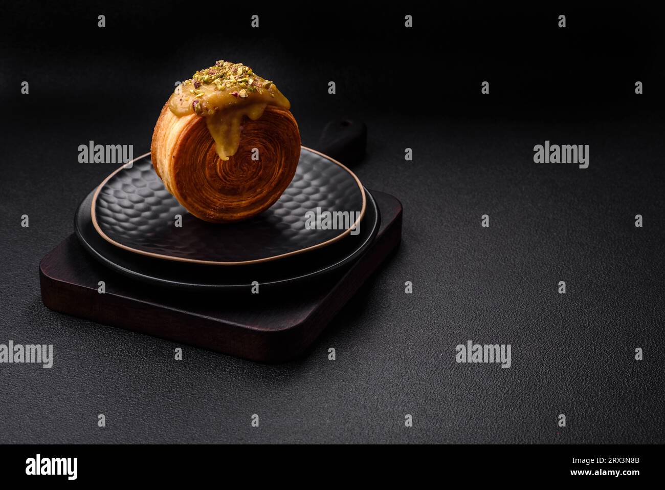 Round puff pastry croissant with raspberry filling or new york roll on ...