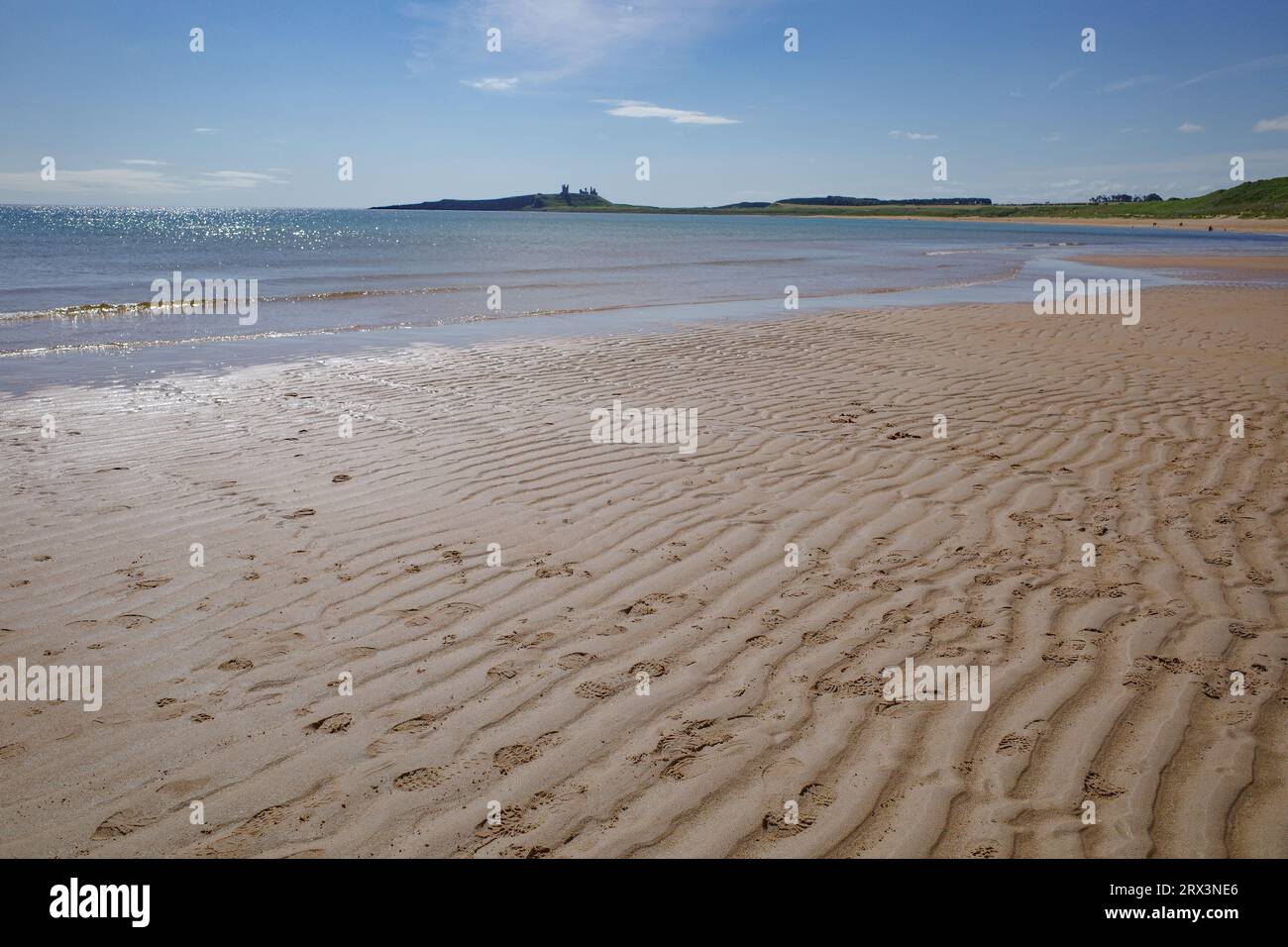 Low Newton, UK - 13 July, 2023: Views of Dunstanburgh castle and the ...