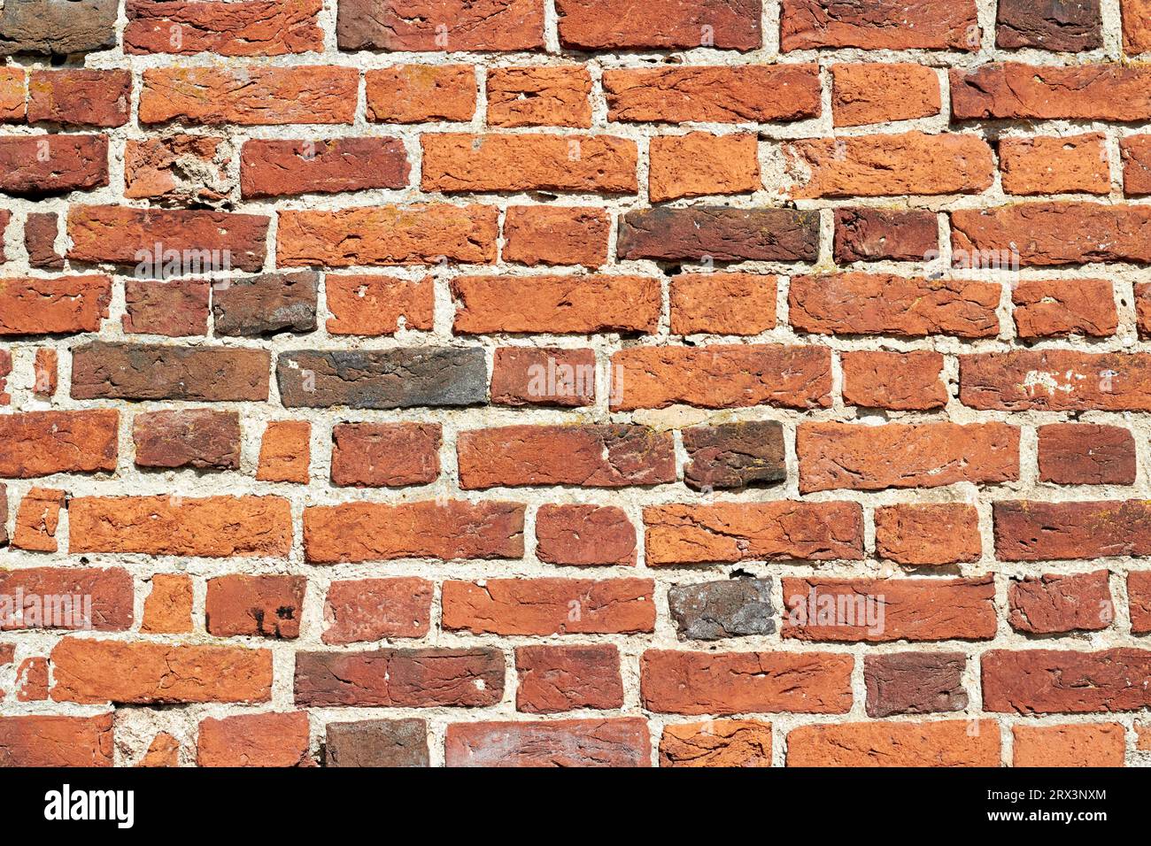 Textured wall made of red burnt brick. Ancient religious buildings ...