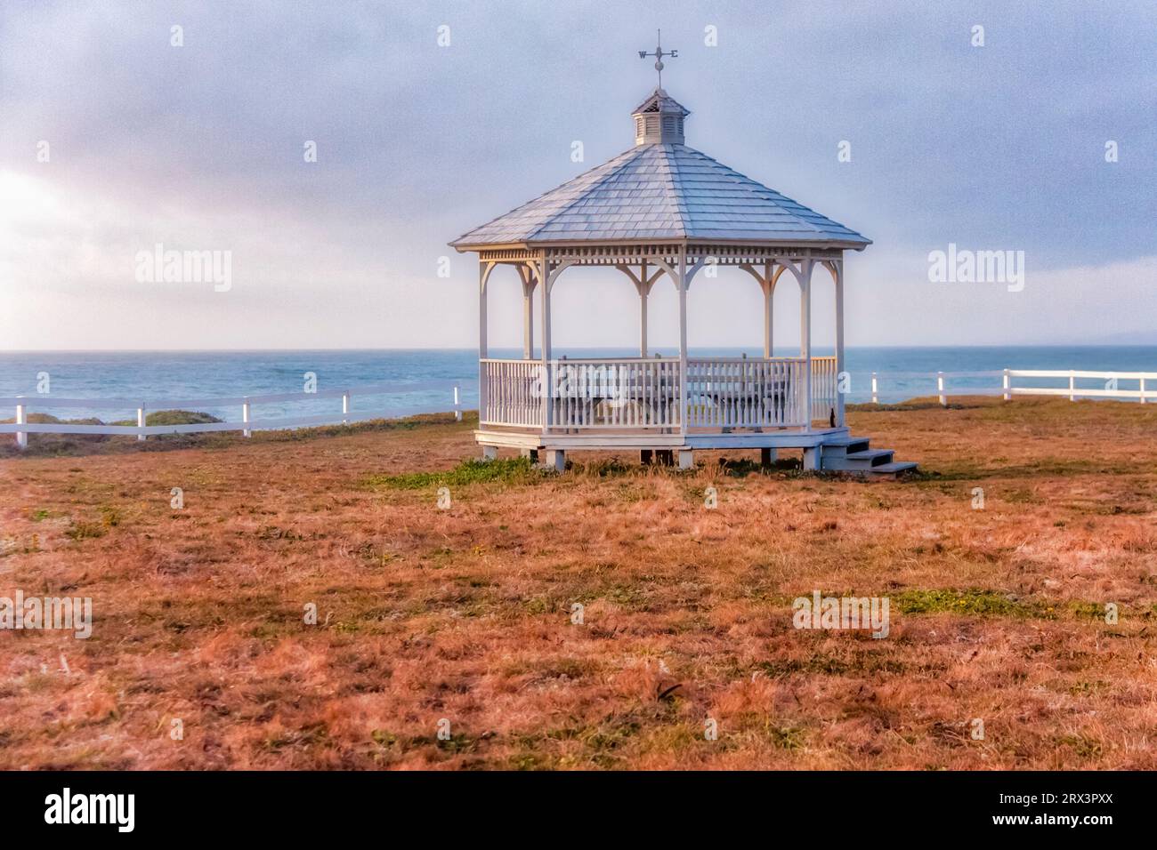 Gazebo with storm clouds at Point Arena Lighthouse peninsula on the ...