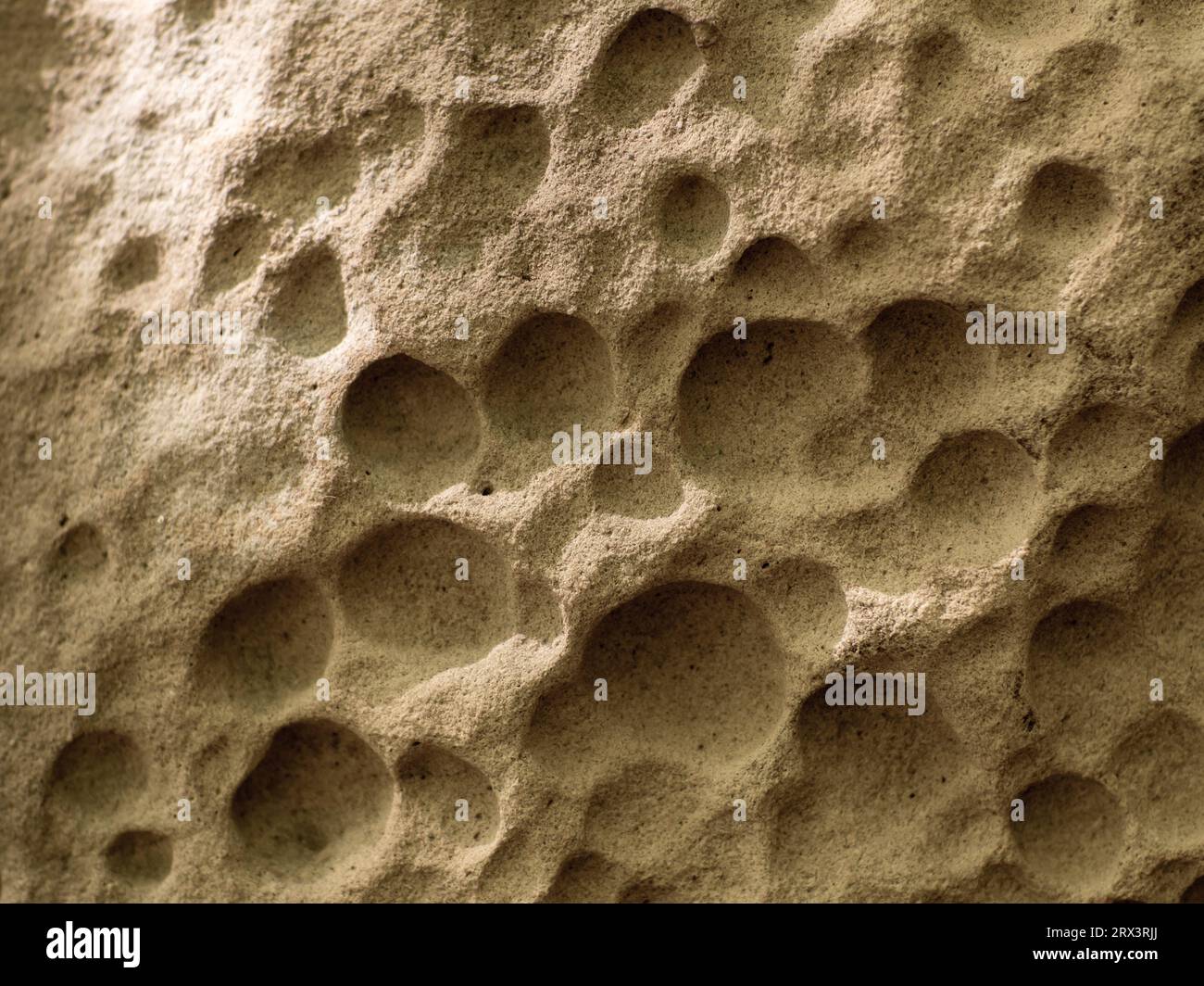 Natural stone It is shaped like a honeycomb hole. Weathered ancient ...