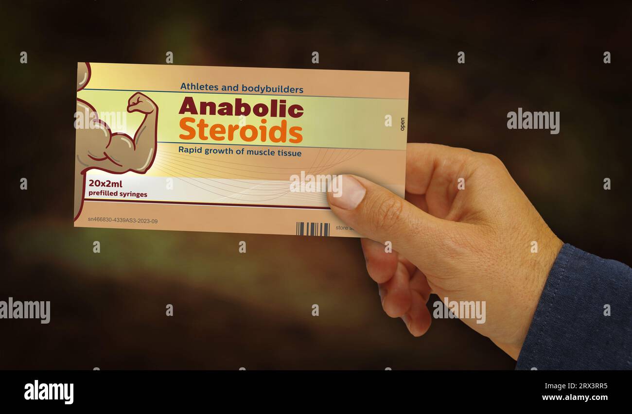 Anabolic steroids tablets box in hand. Bodybuilding doping and athletic ...