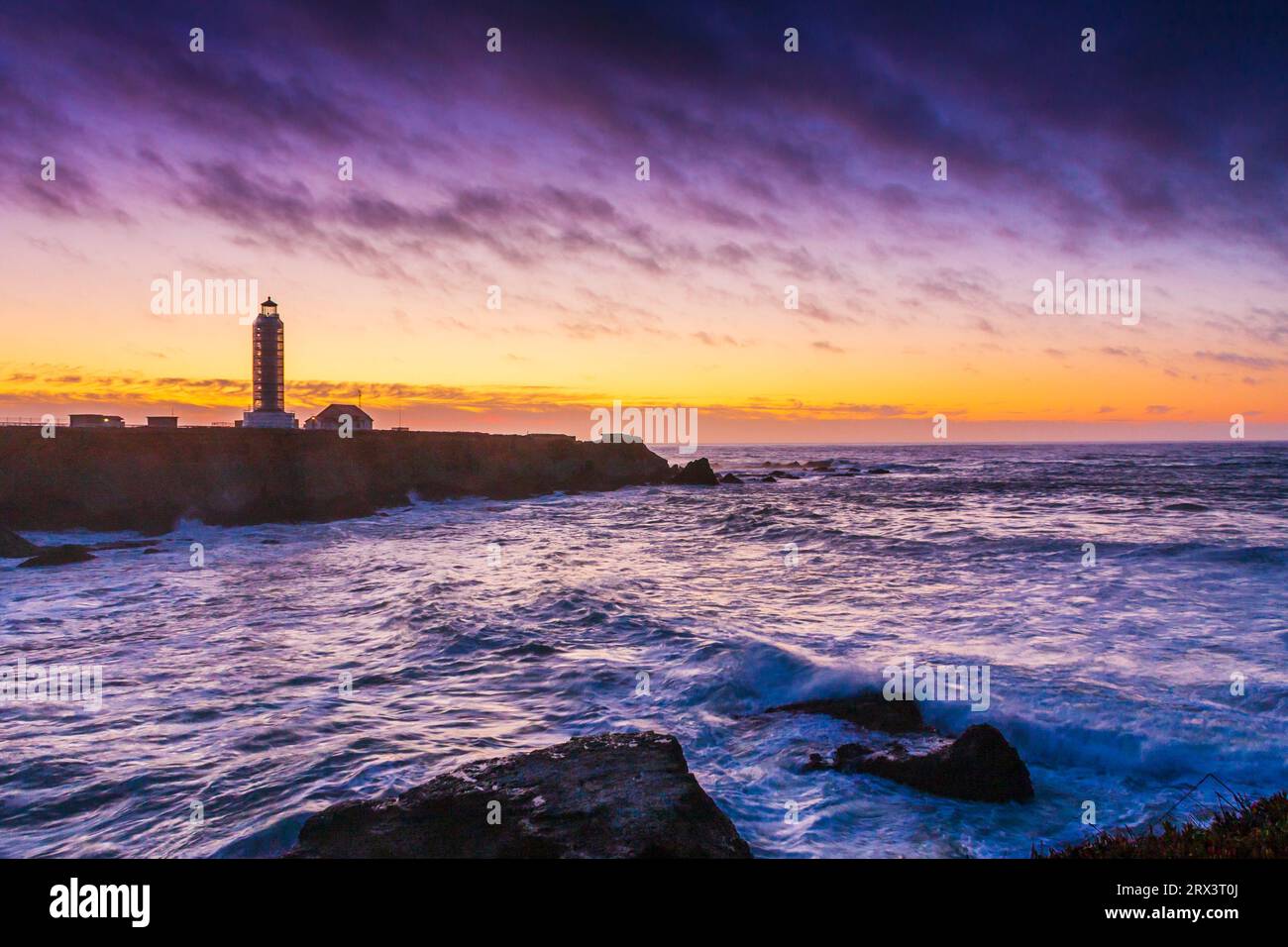 Point Arena Lighthouse at sunset, with storm coming in off the pacific ...