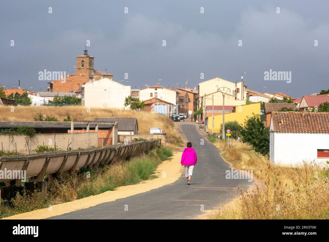 Pilgrims walking the Camino de Santiago pilgrimage route, the way of St ...