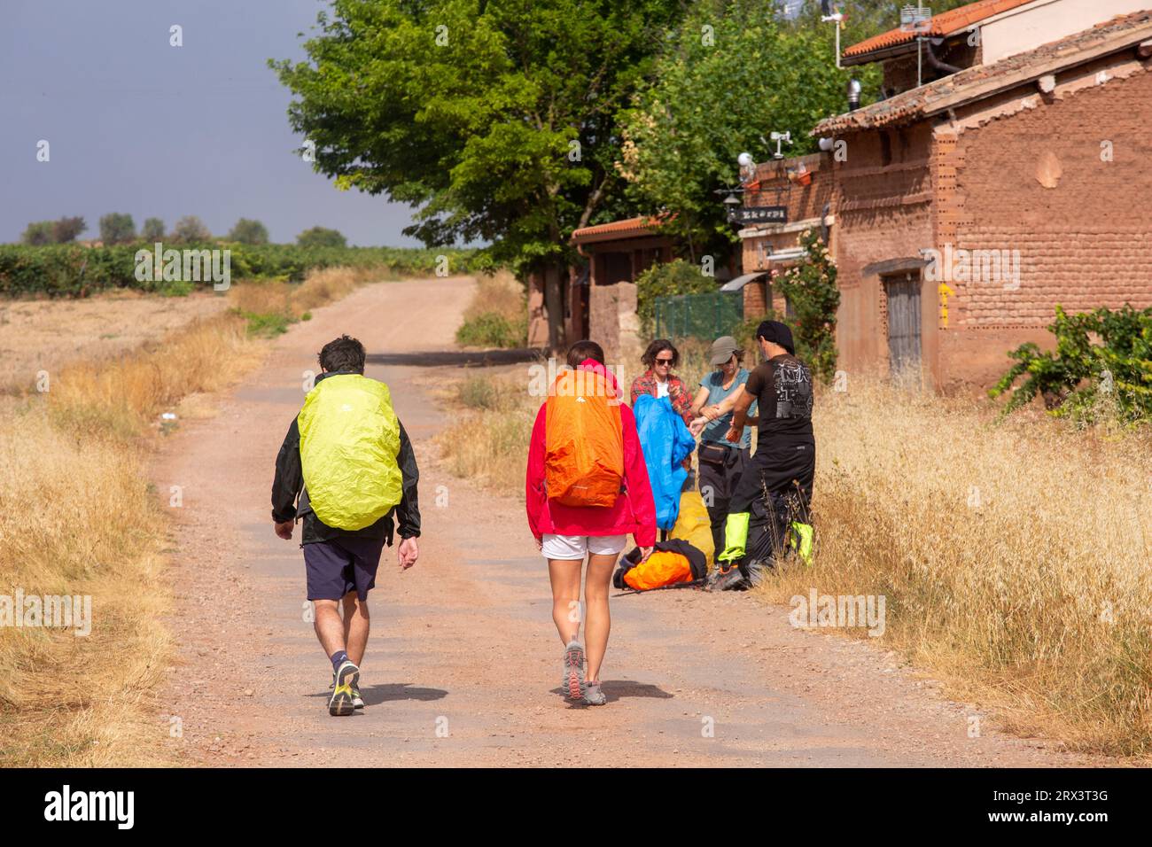Pilgrims walking the Camino de Santiago pilgrimage route, the way of St ...