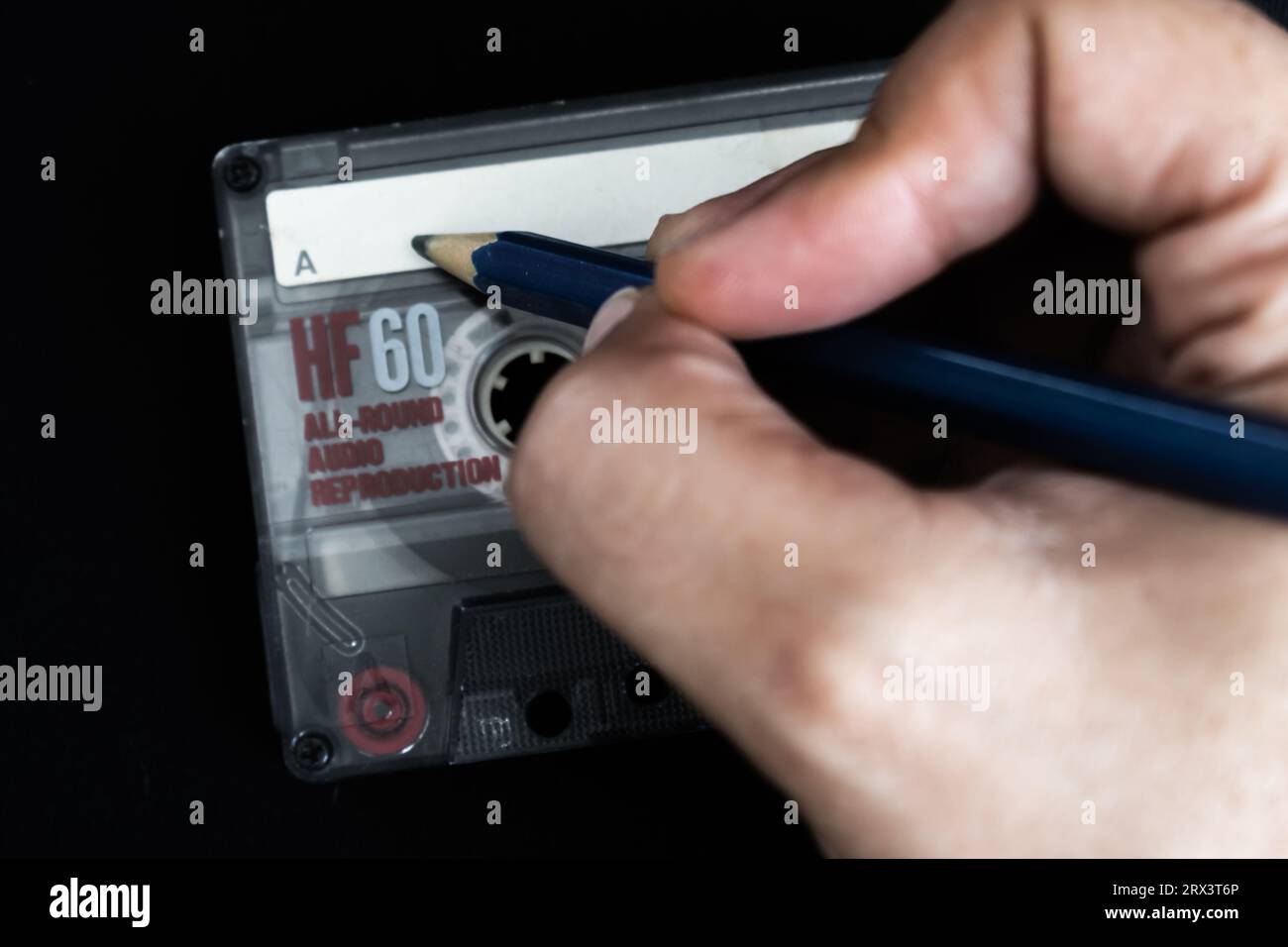 Cassette in hand hi-res stock photography and images - Alamy