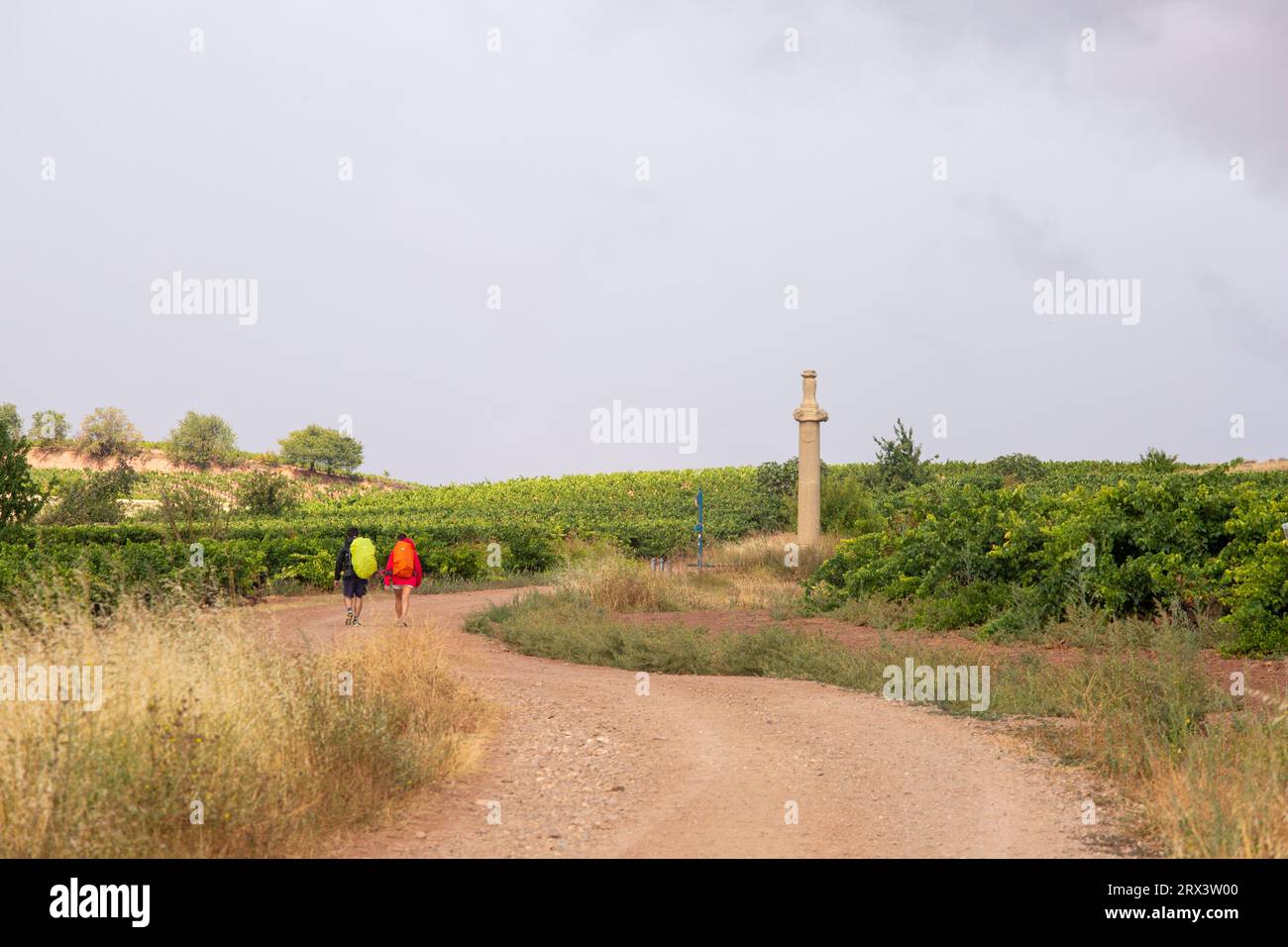 Pilgrims walking the Camino de Santiago pilgrimage route, the way of St ...