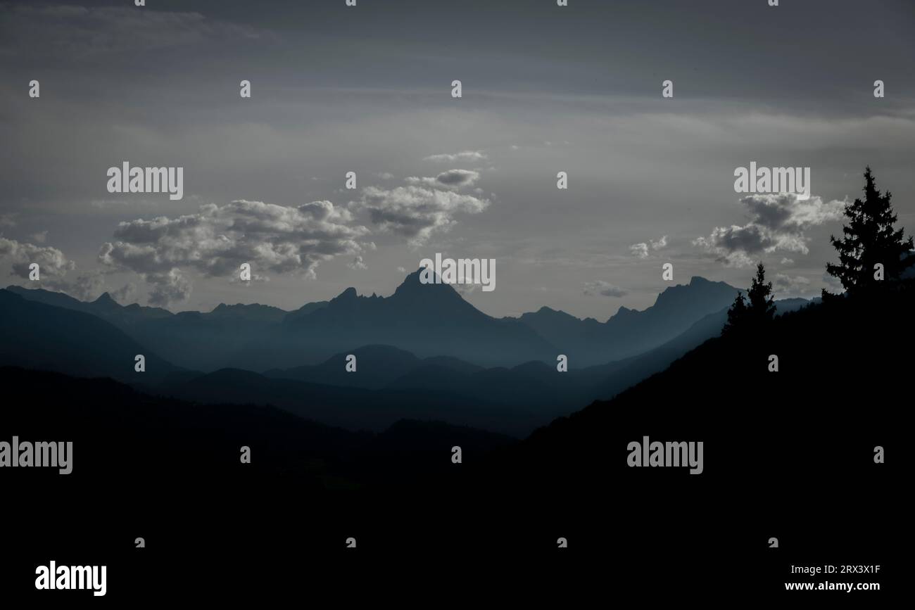 Silhouette color view from path to Gaisberg hill over Salzburg city in summer hot evening Stock ...
