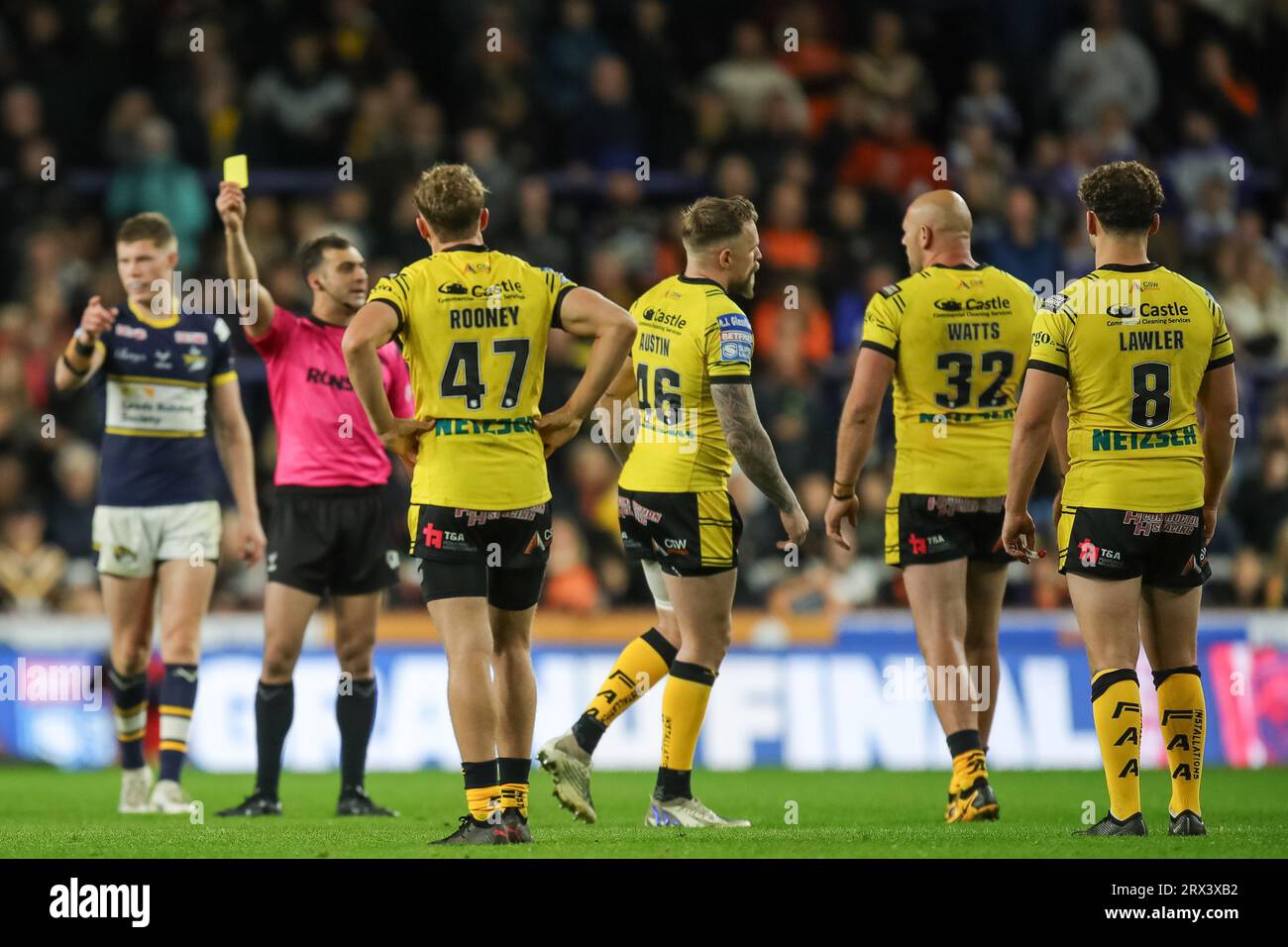 A dejected Blake Austin #46 of Castleford Tigers is shown a yellow card ...