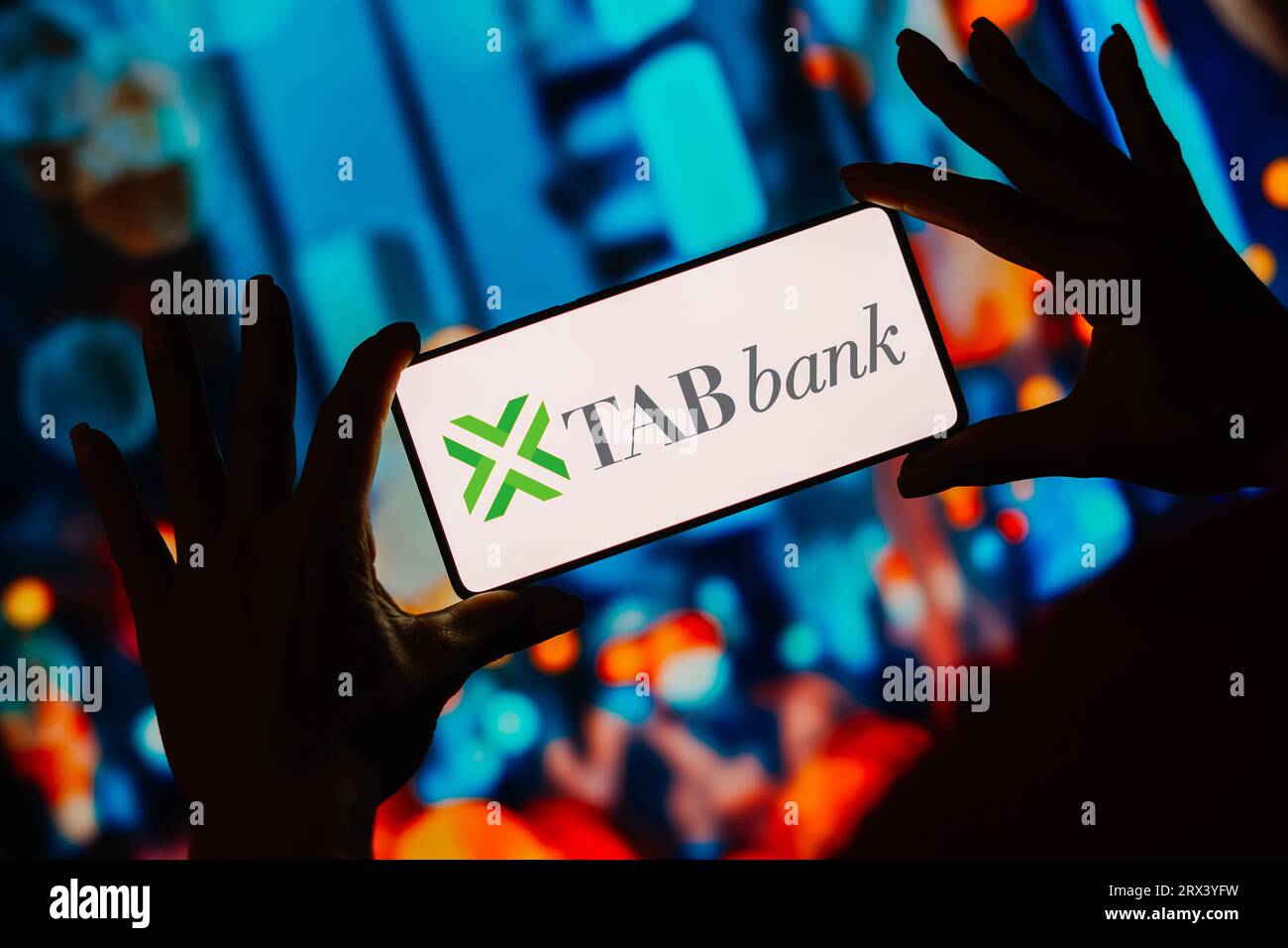 In this photo illustration, the TAB Bank logo is displayed on a ...