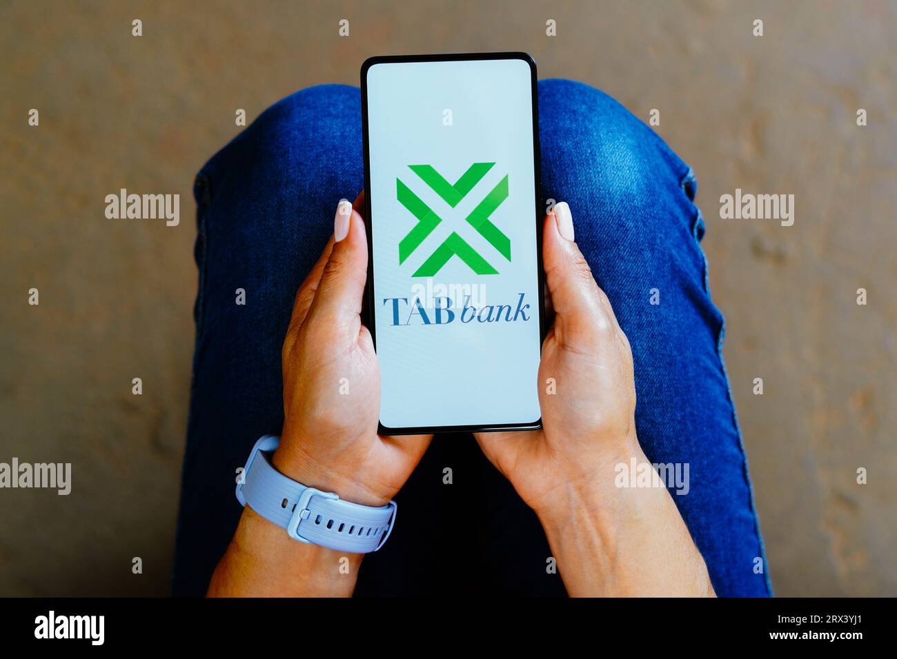 In this photo illustration, the TAB Bank logo is displayed on a ...