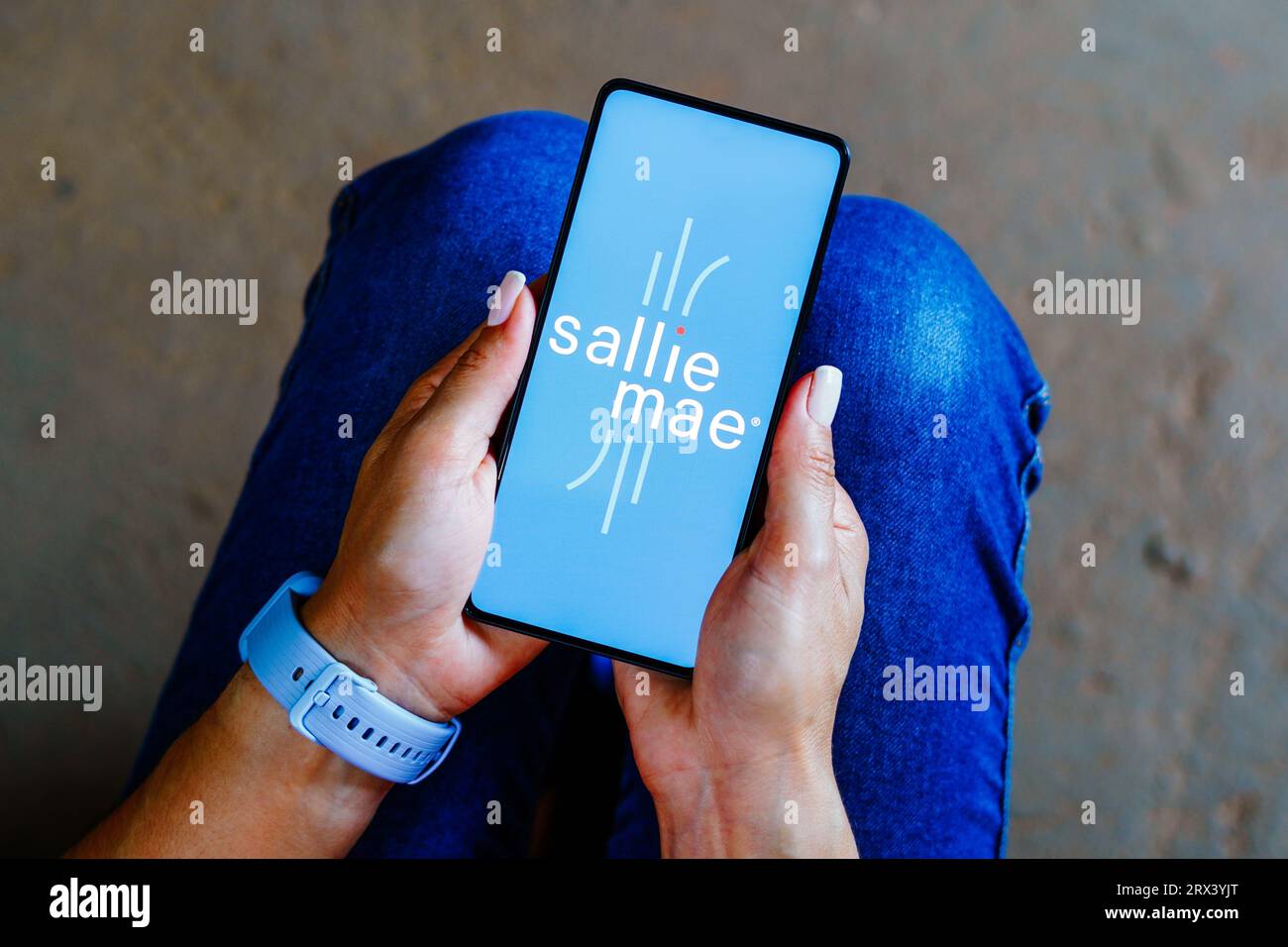 In this photo illustration, the Sallie Mae (SLM) logo is displayed on a ...