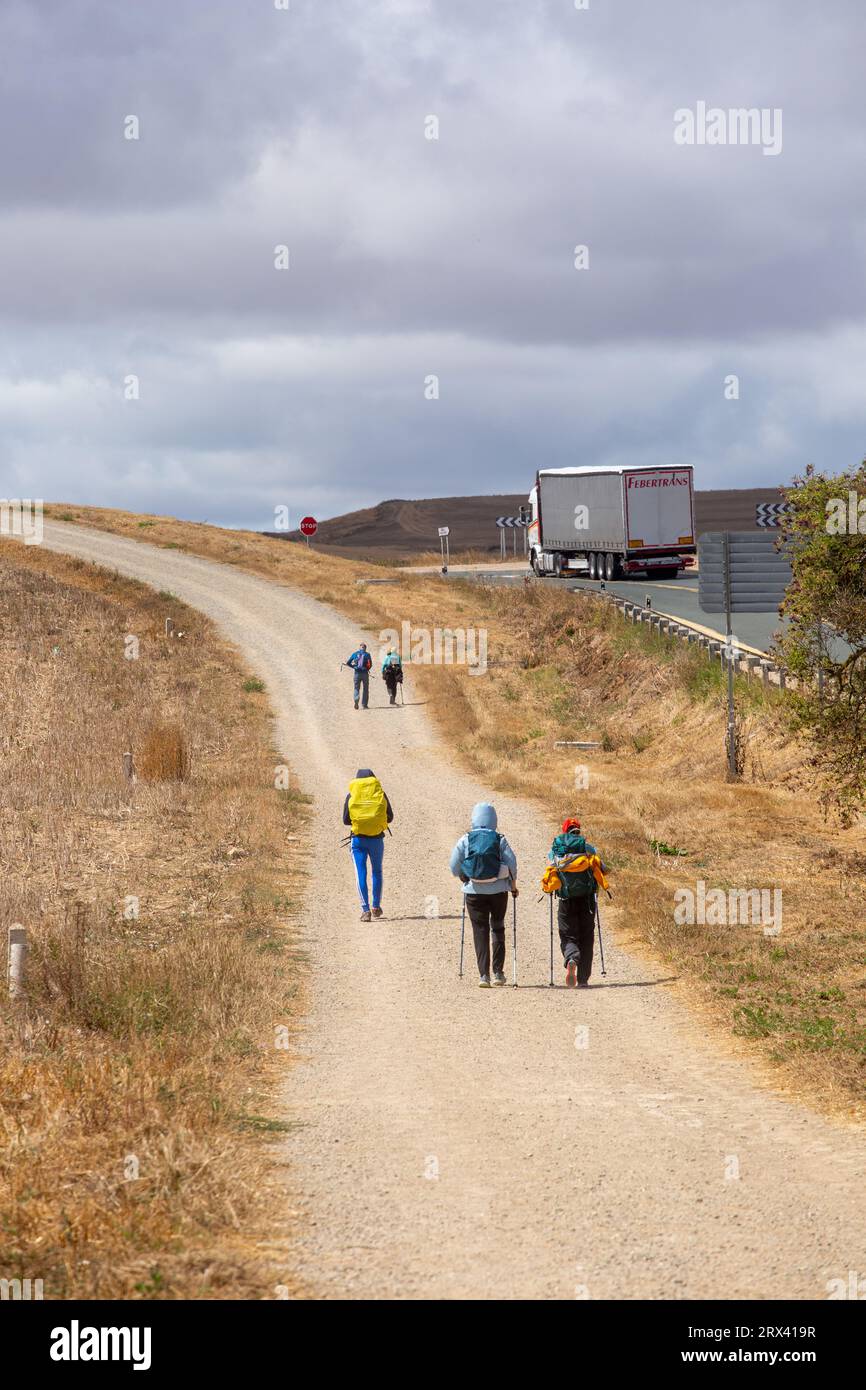 Pilgrims walking the Camino de Santiago pilgrimage route, the way of St ...
