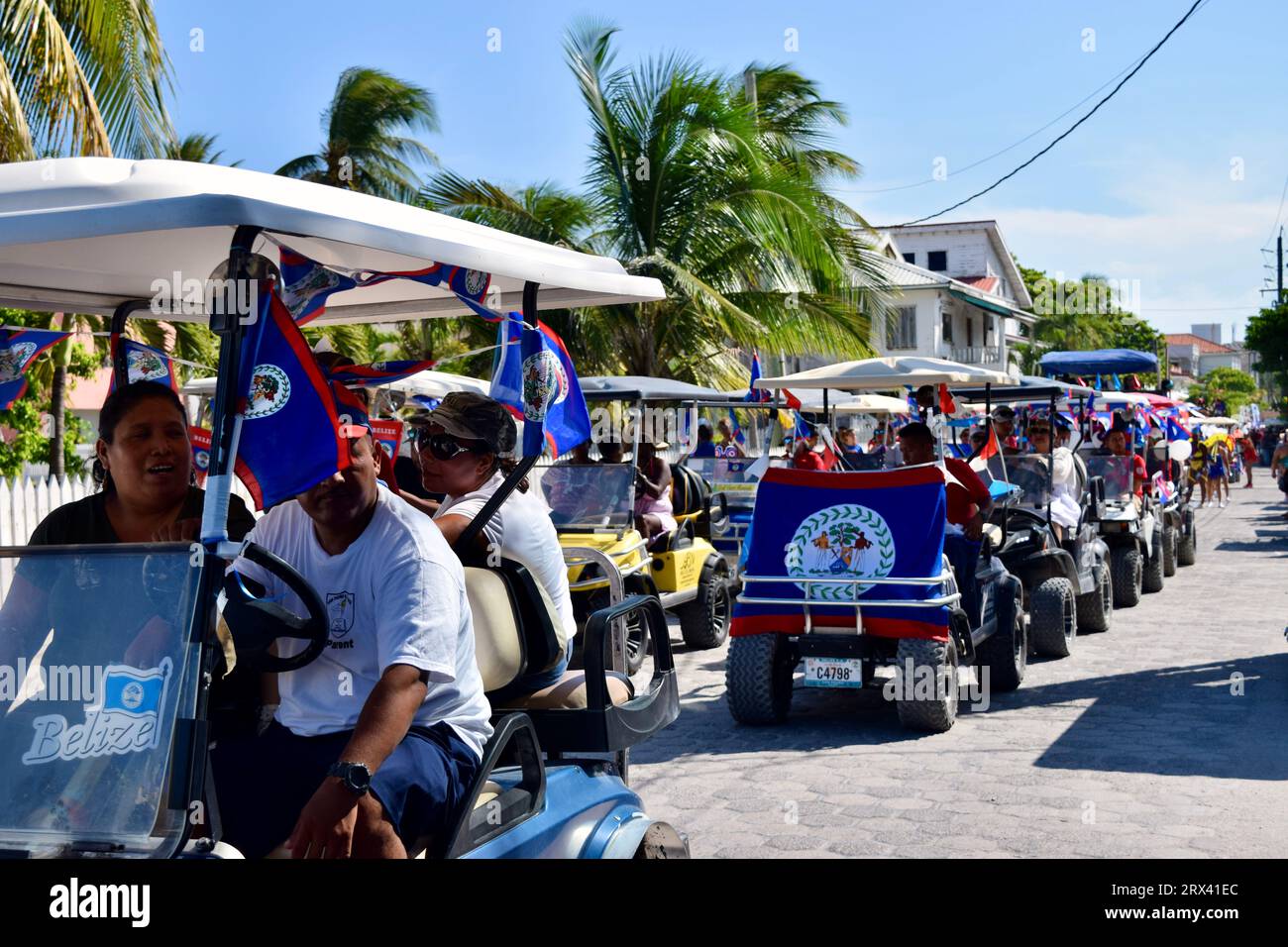 The 2023 San Pedro Town Carnival Parade. Patriotic golf carts flying ...
