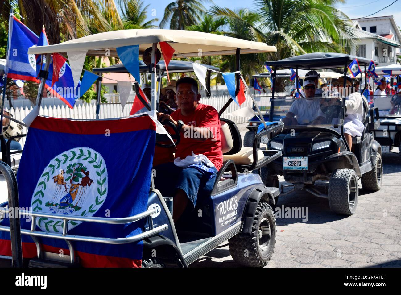The 2023 San Pedro Town Carnival Parade. Patriotic golf carts flying ...