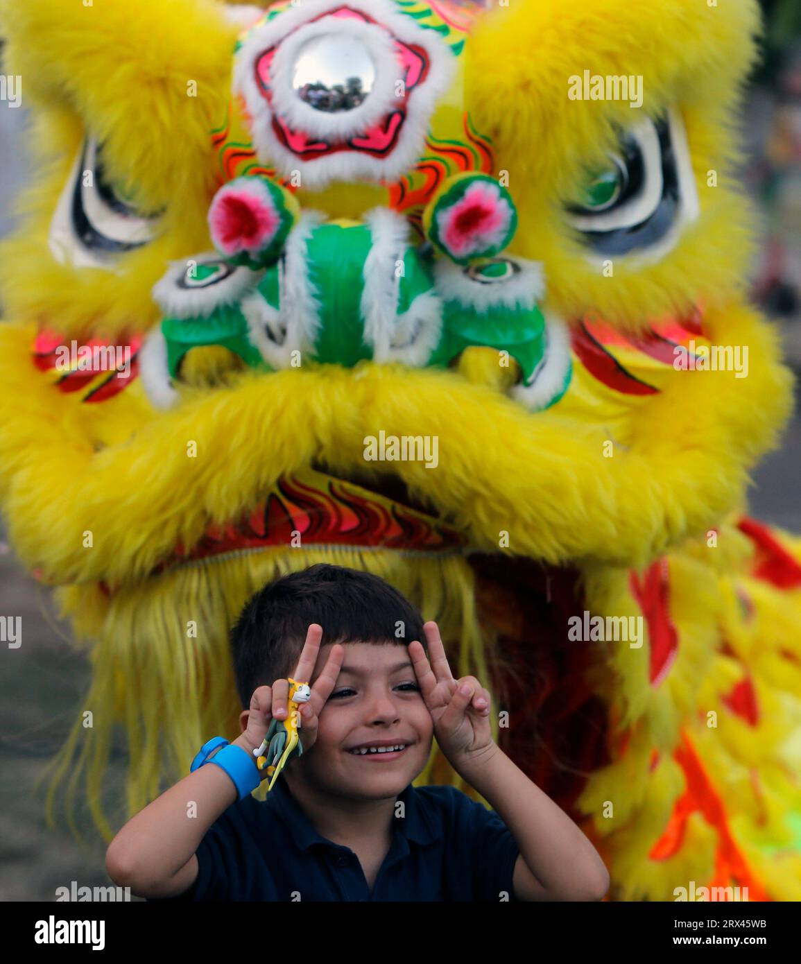 Bucharest, Romania. 22nd Sep, 2023. A boy poses next to an artist ...