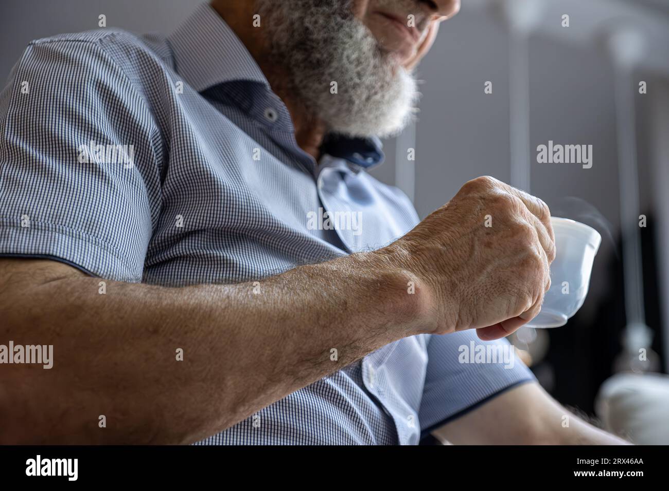 Old man drinking coffee with smile on his face Stock Photo - Alamy