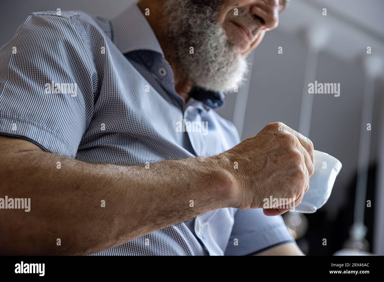 Old man drinking coffee with smile on his face Stock Photo - Alamy