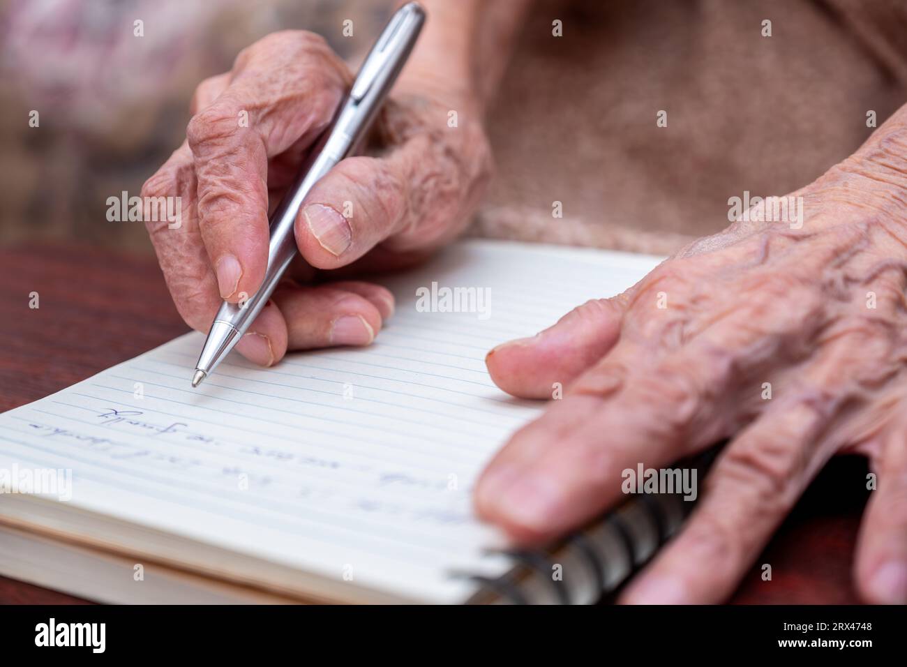 Letter elder woman hand hi-res stock photography and images - Alamy