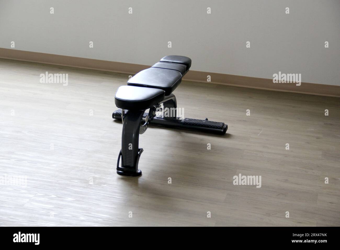 Short weight bench to exercise in gym alone on wooden floor for healthy ...