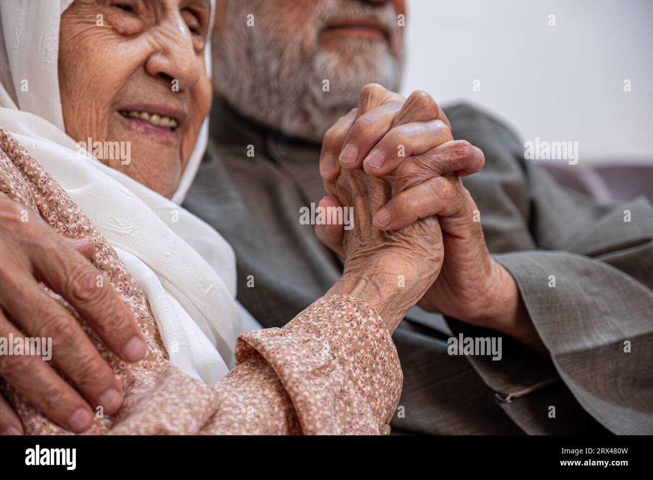 Arabic old couples love each other while holding their hands Stock ...
