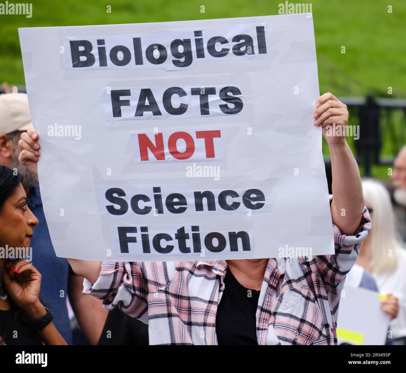 sign: "Biological Facts Not Science Fiction " held by anti LGBTQ in ...