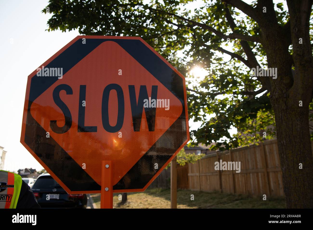 Traffic control with stop slow sign according to construction plan ...