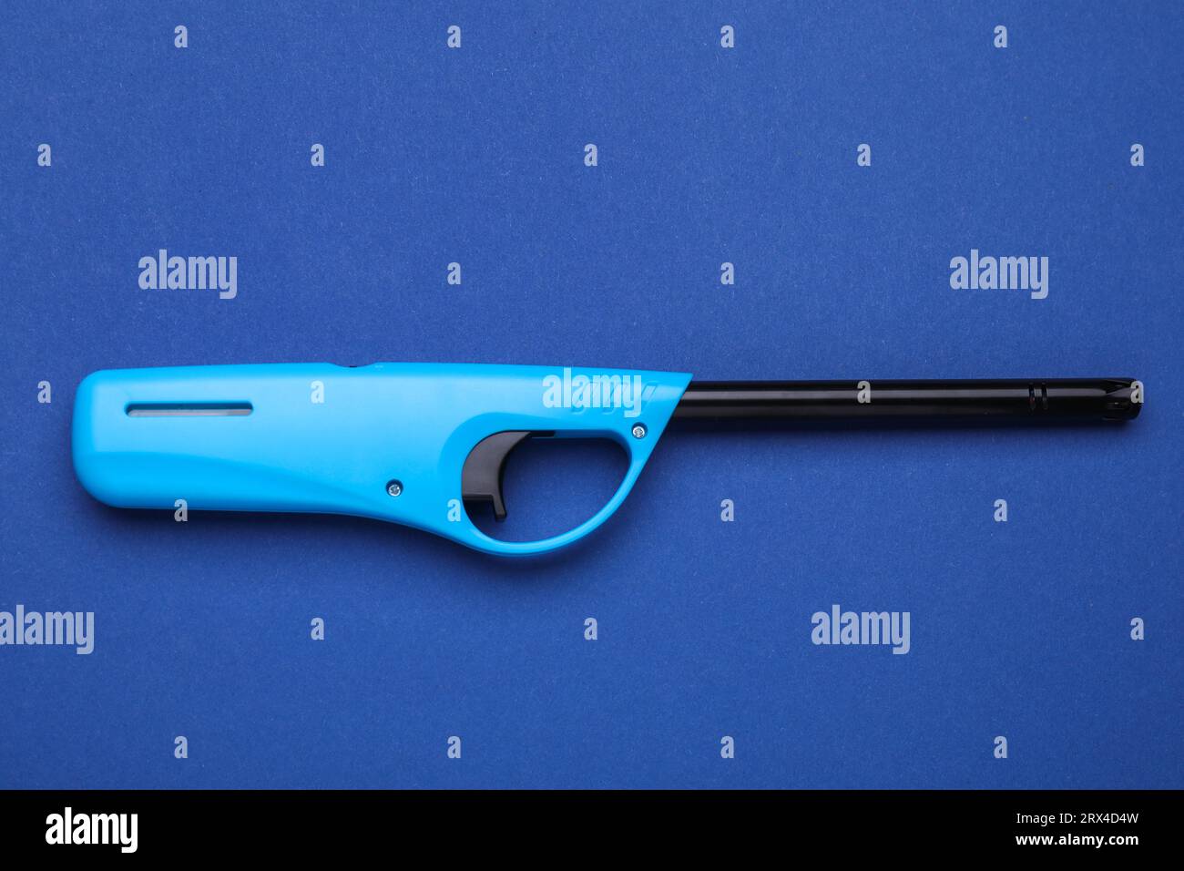 One gas lighter on blue background, top view Stock Photo - Alamy