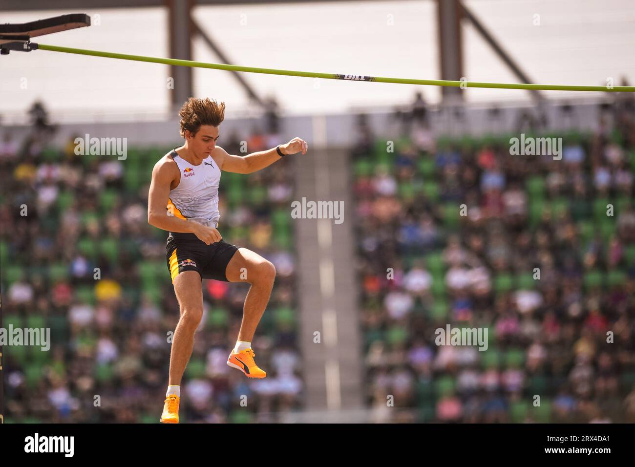 Armand Duplantis (SWE) clears a world record height of 20-4 (6.23 m) to ...