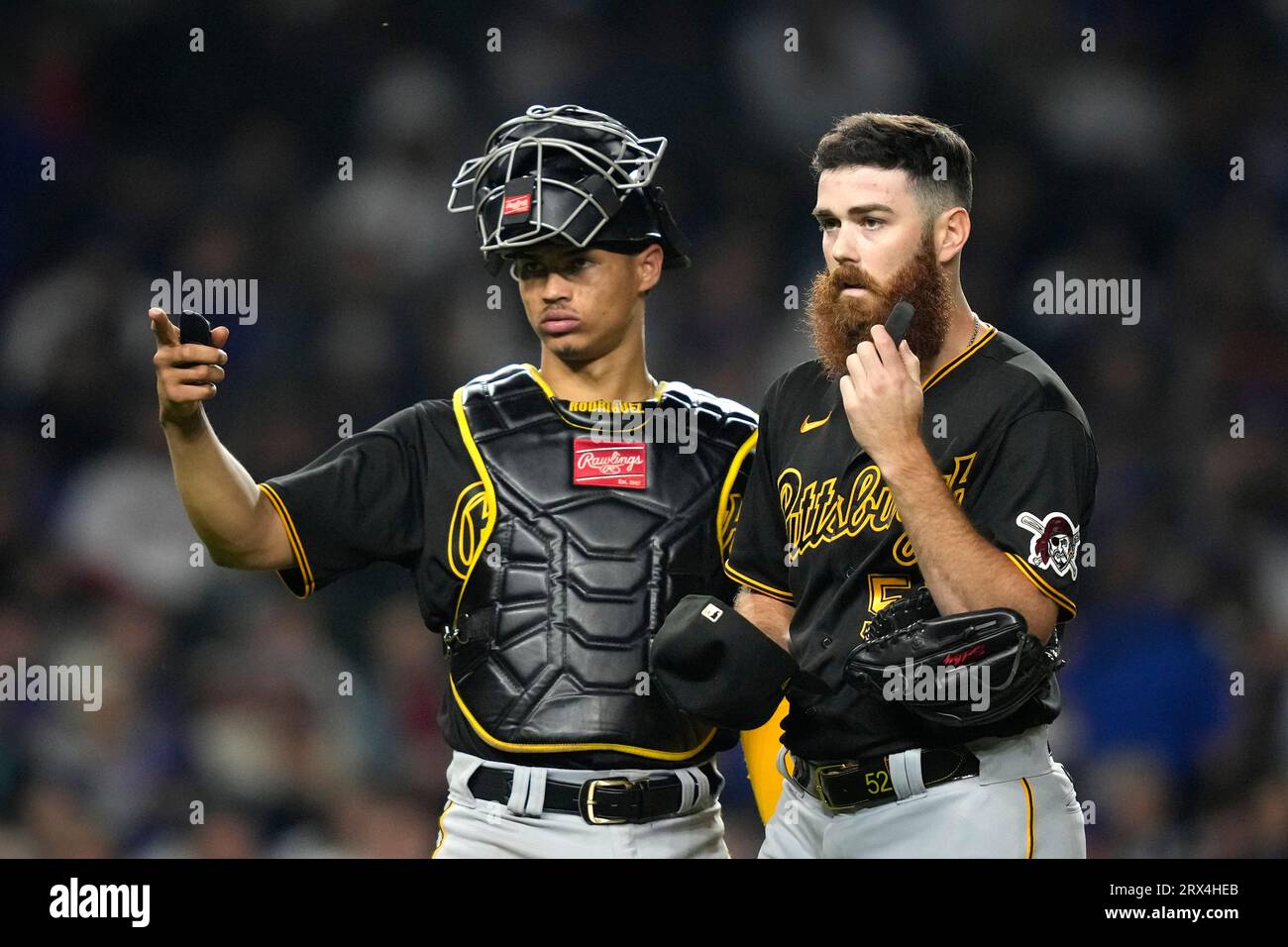 Pittsburgh Pirates catcher Endy Rodriguez and relief pitcher Colin ...
