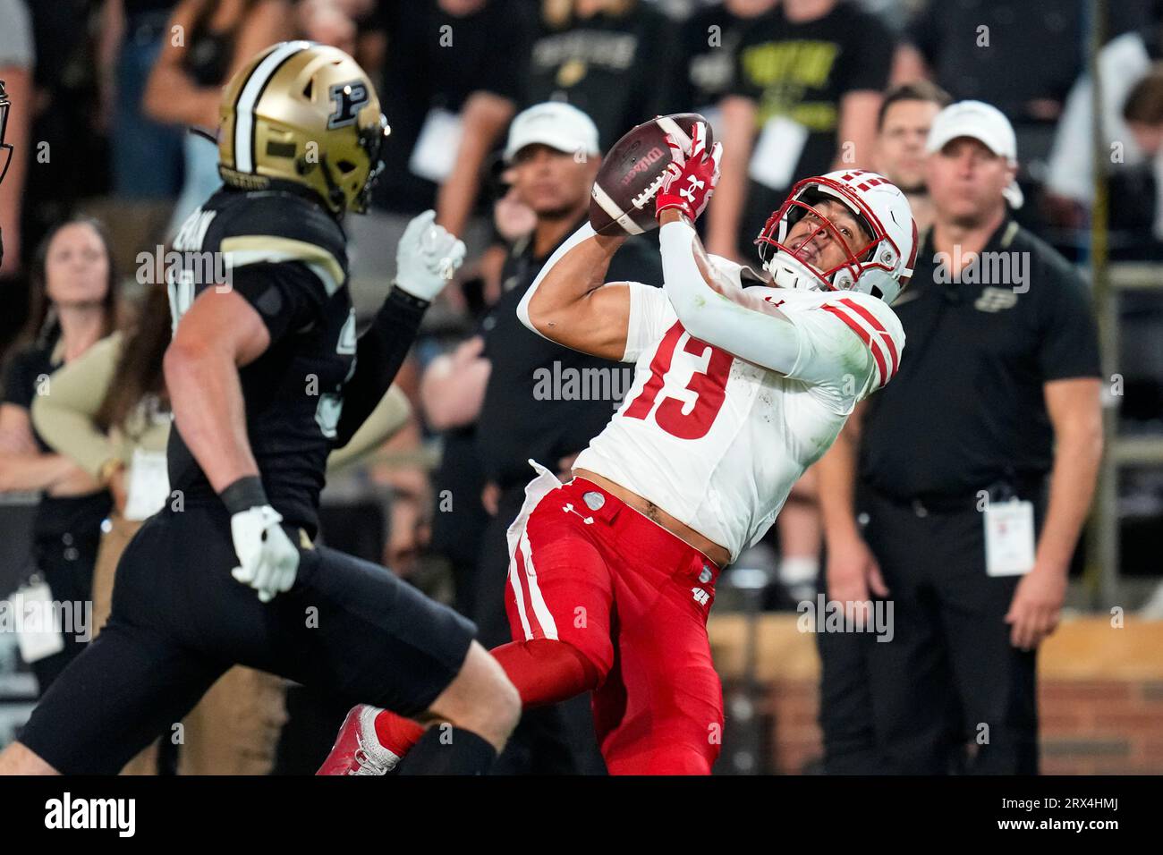 Wisconsin wide receiver Chimere Dike (13) makes a catch in front of ...