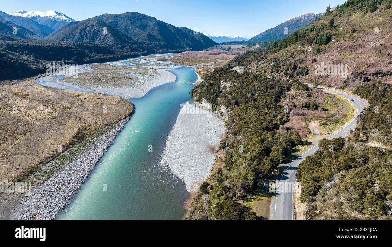 Aerial river forest and mountain scenery of the stunning road through ...