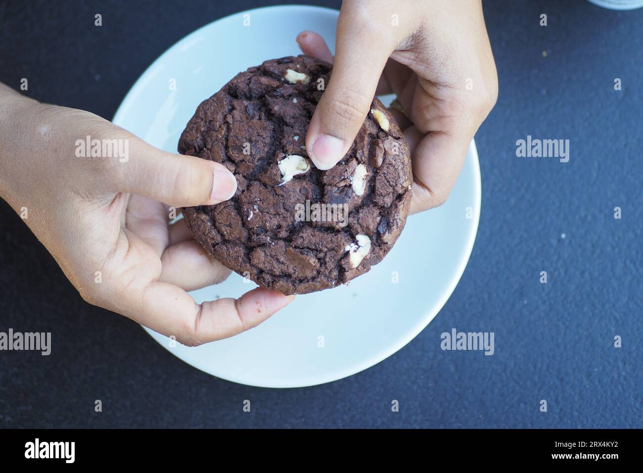 overhead view of breaking sweet cookies on Stock Photo - Alamy