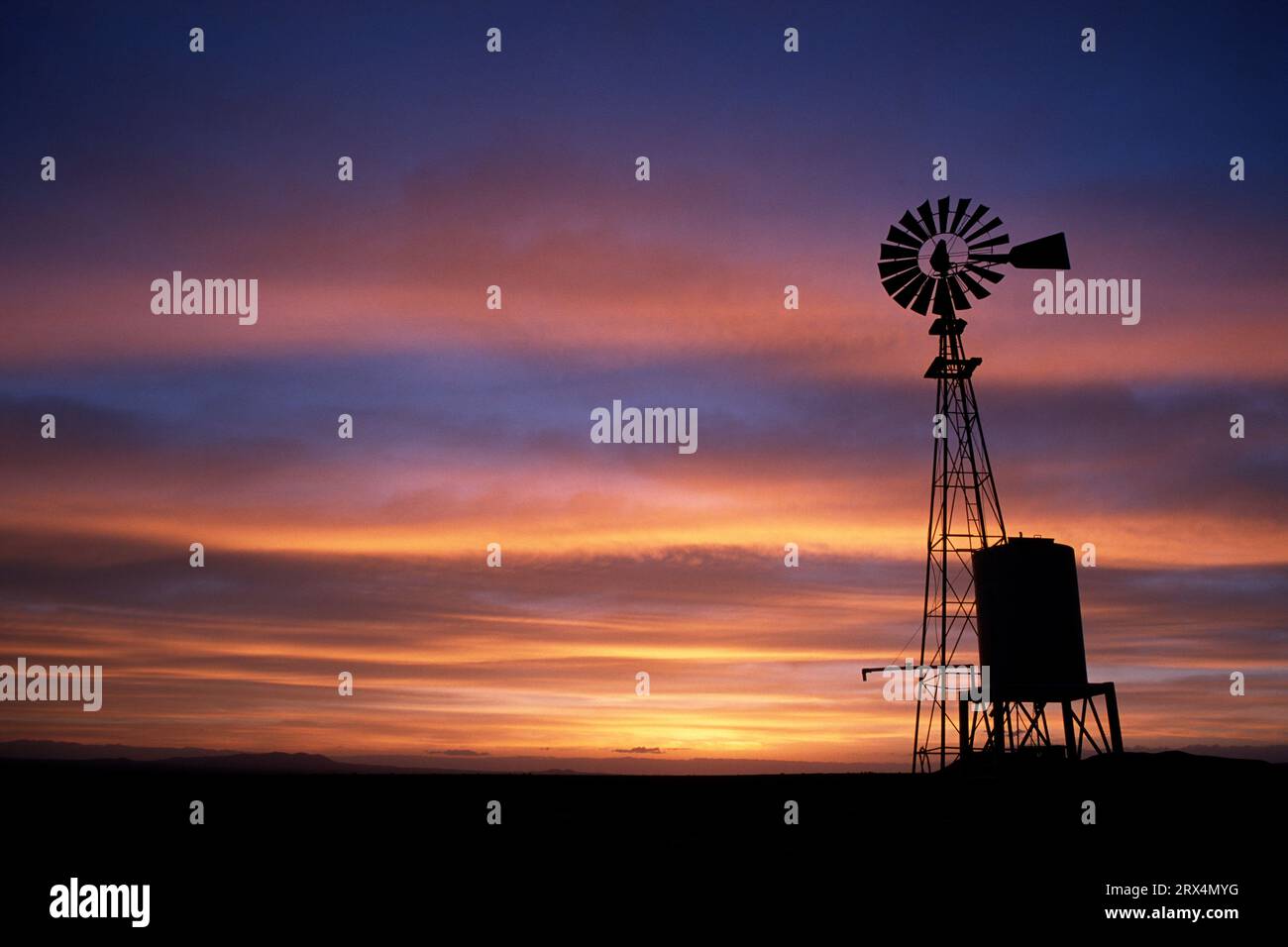 Windmill sunset, City of Rocks State Park, New Mexico Stock Photo - Alamy