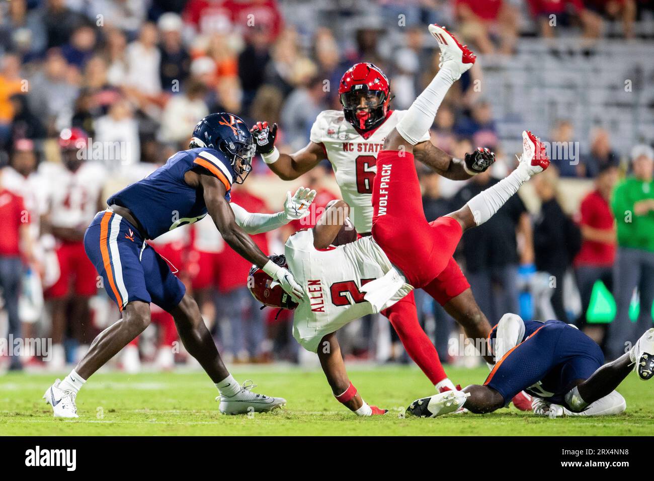 North Carolina State running back Michael Allen (2) flips through the ...