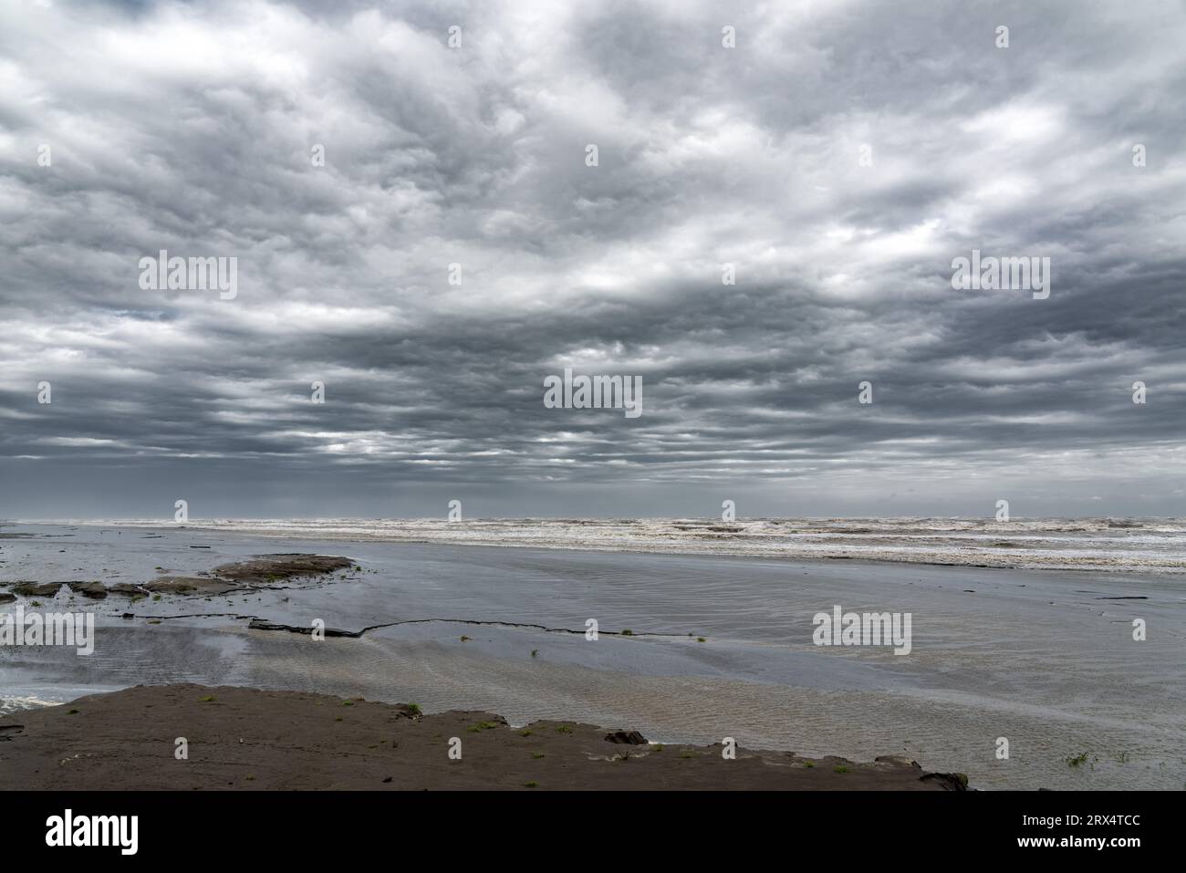 Sand sandy sea clouds dramatic weather hi-res stock photography and ...