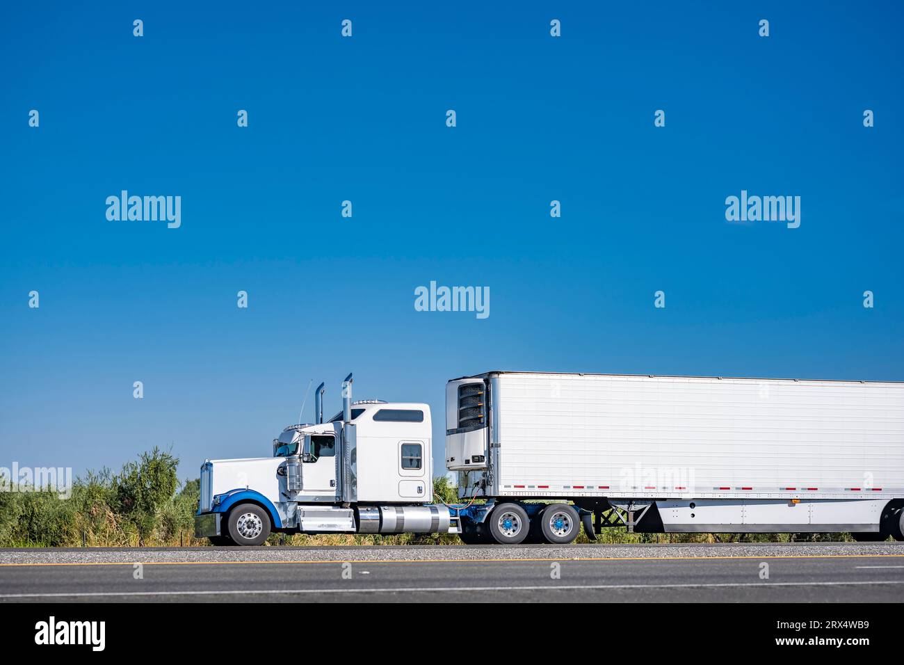 Industrial long hauler carrier white big rig semi truck tractor with ...