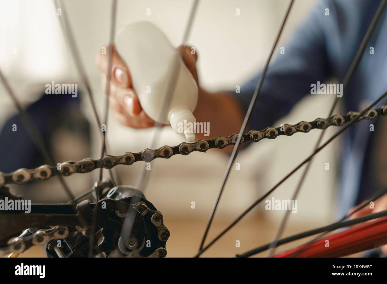 Closeup person oiling chain hi-res stock photography and images - Alamy