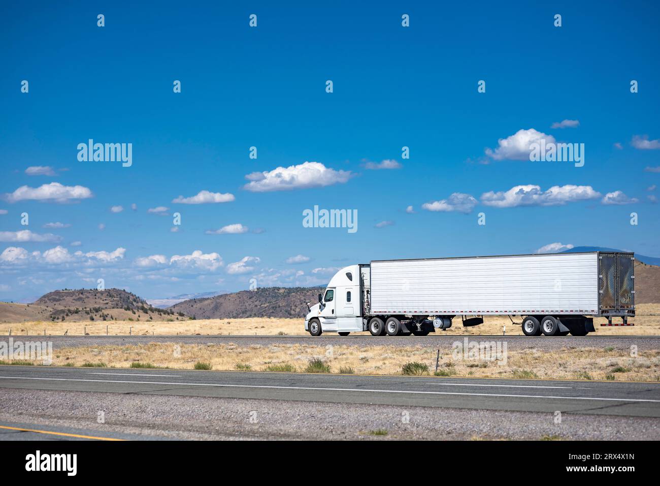 Industrial long hauler carrier white big rig semi truck tractor with ...