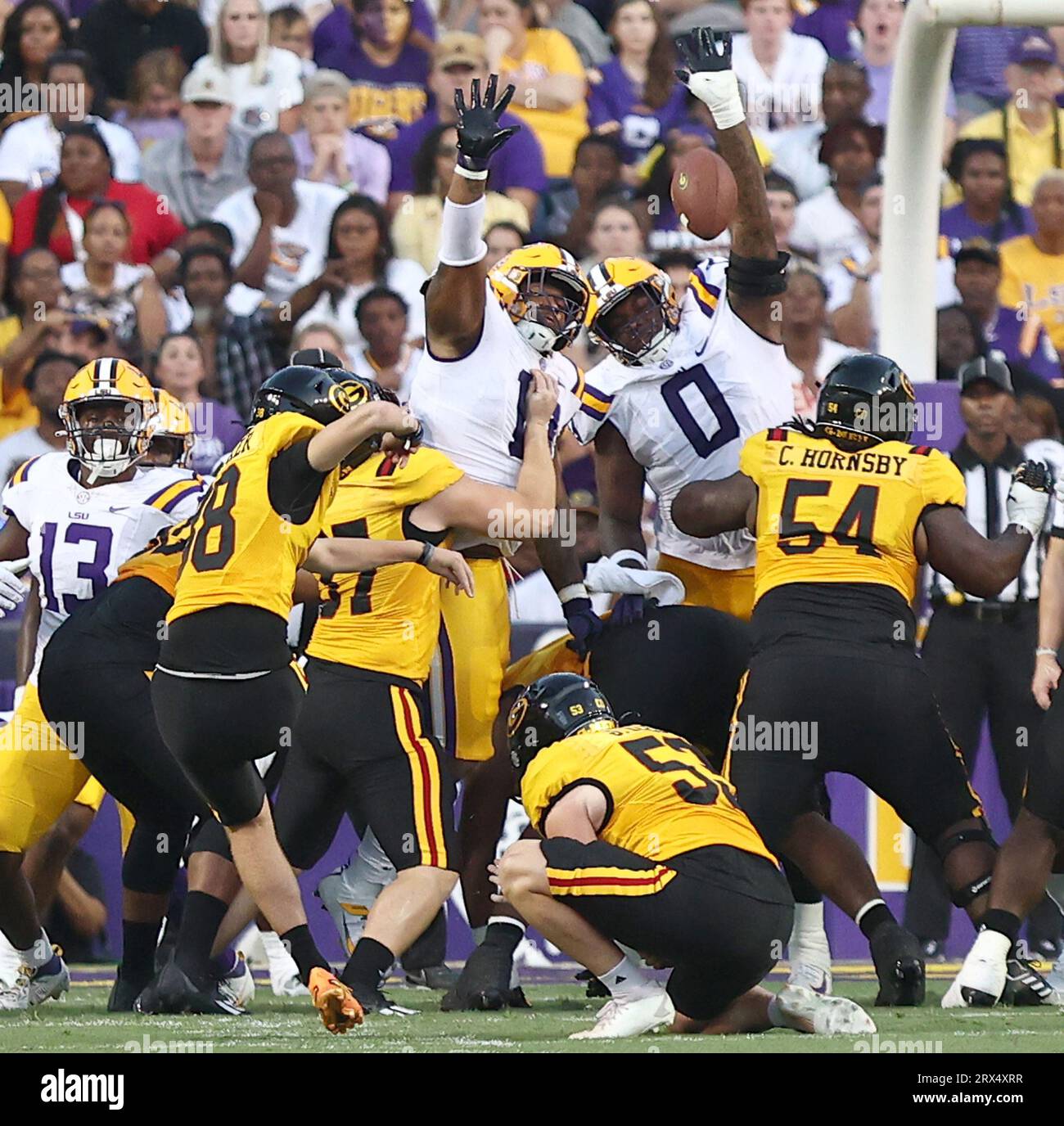 LSU Tigers defensive tackles Mekhi Wingo (18) and Maason Smith (0) both ...