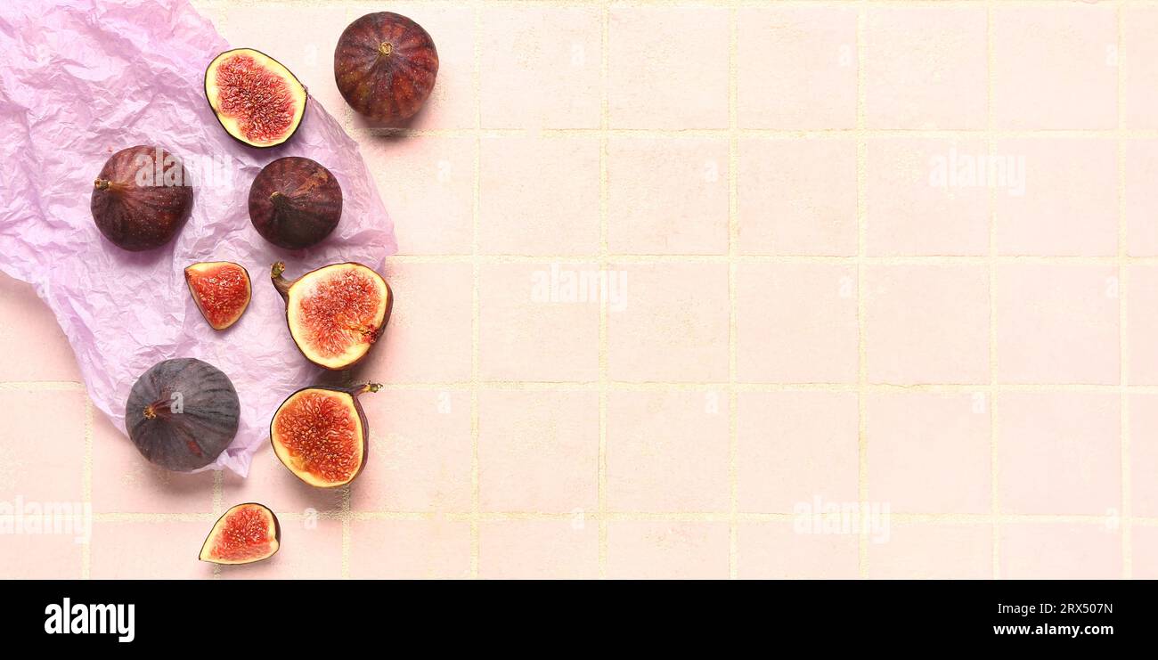 Many fresh ripe figs on light tile background with space for text Stock ...