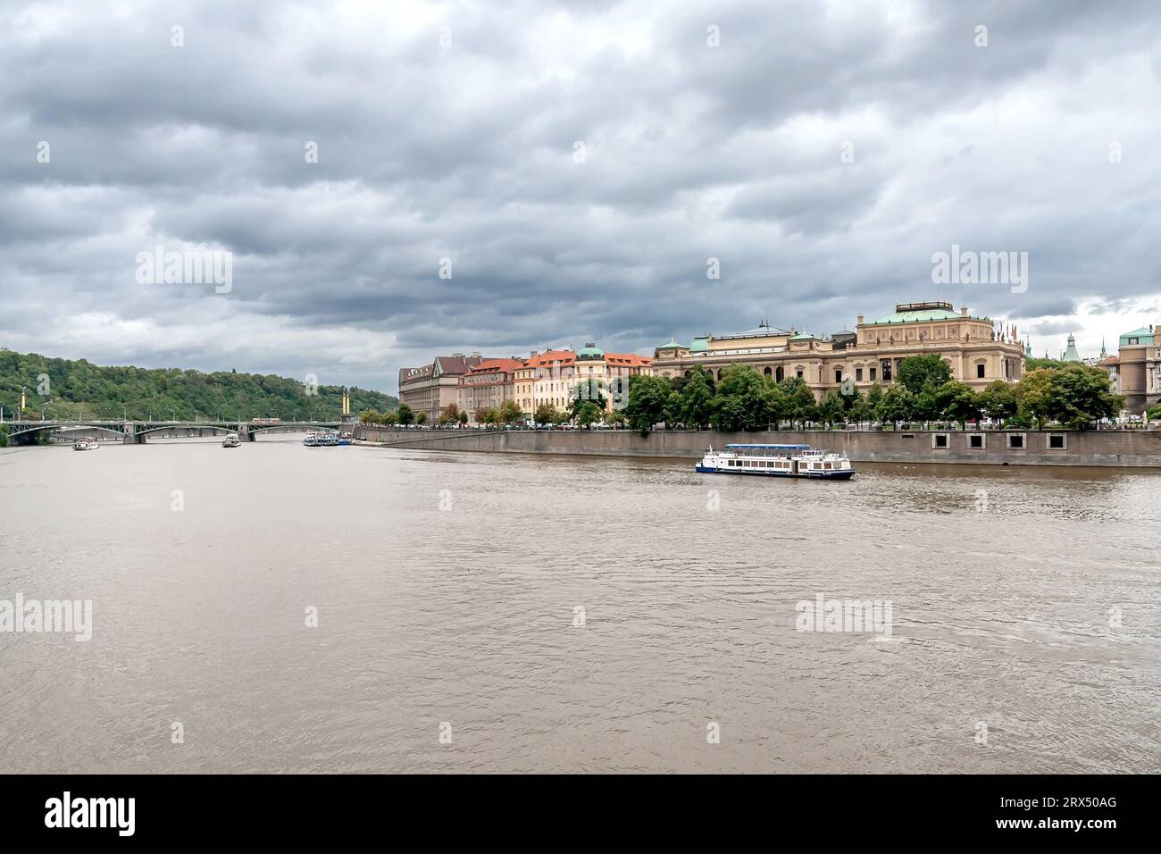 Cruise ships on the Vltava River, Rudolfinum, Prague Conservatory, and ...