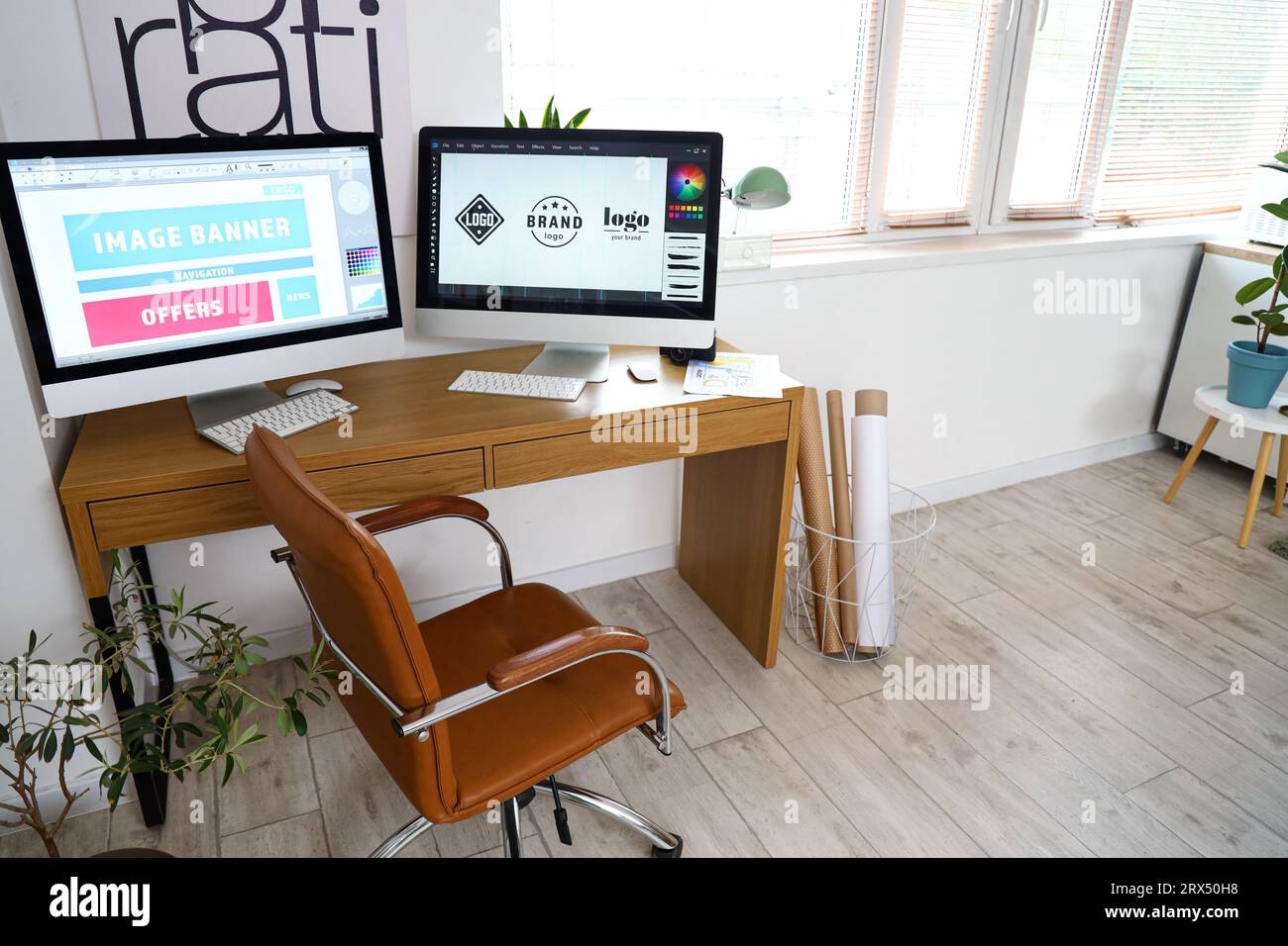 Graphic designer's workplace with computer monitors in office Stock ...