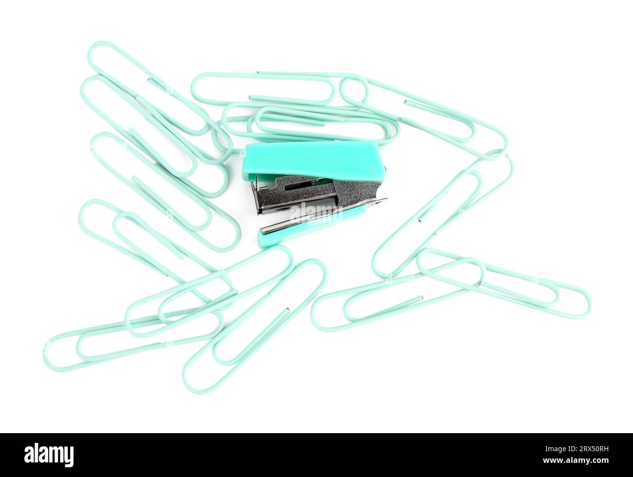 Colorful paper clips and stapler on white background Stock Photo - Alamy