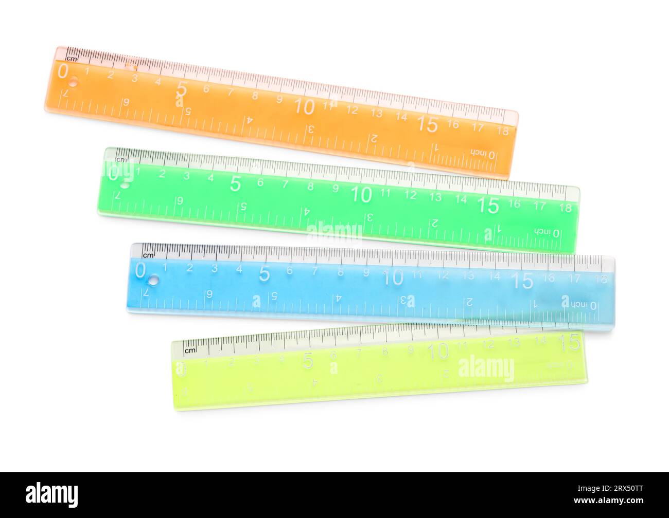 Colorful plastic rulers on white background Stock Photo - Alamy